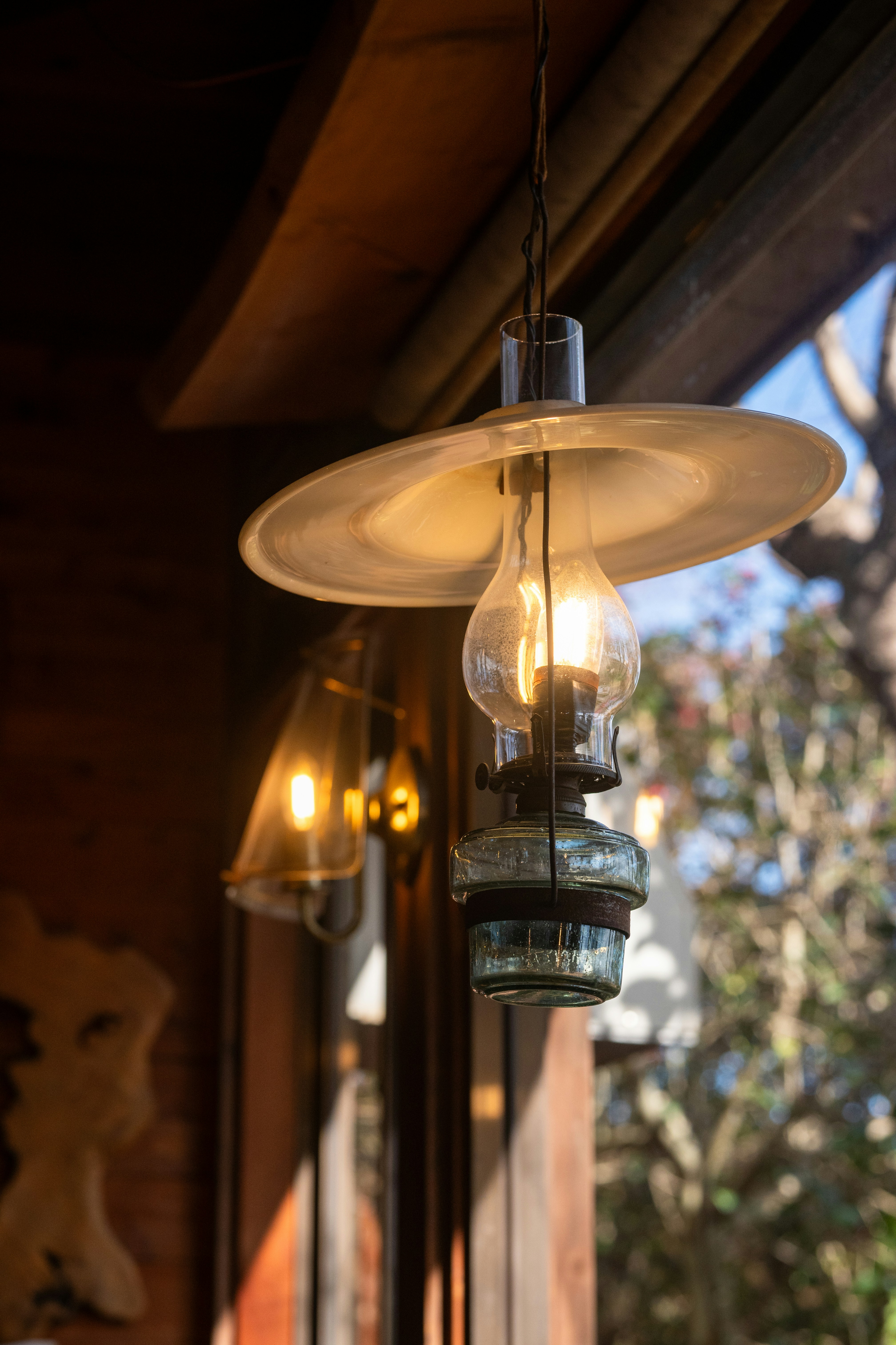 A couple of lights that are hanging from a ceiling photo – Free Lamp ...