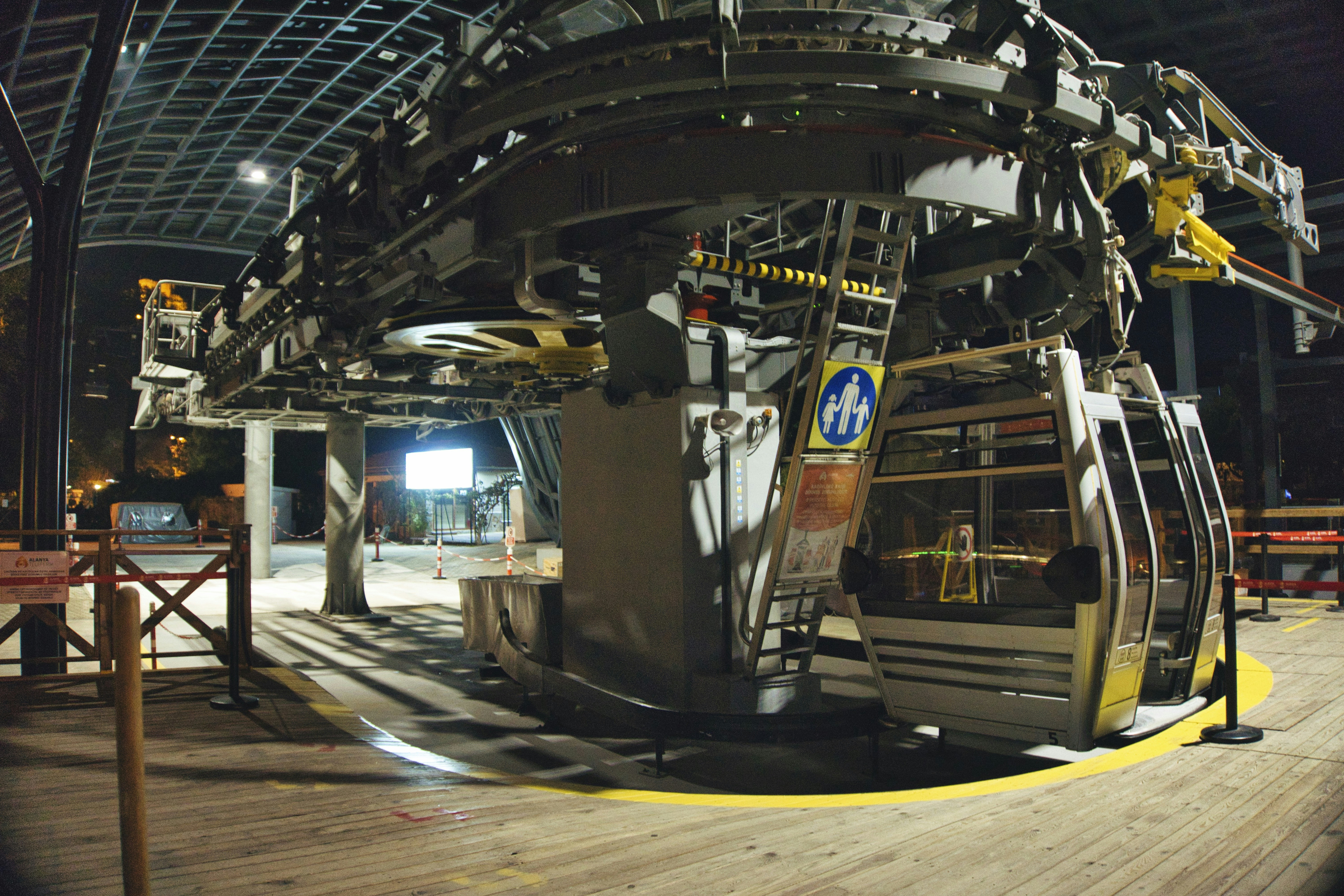 A large metal object sitting inside of a building photo – Free Factory ...