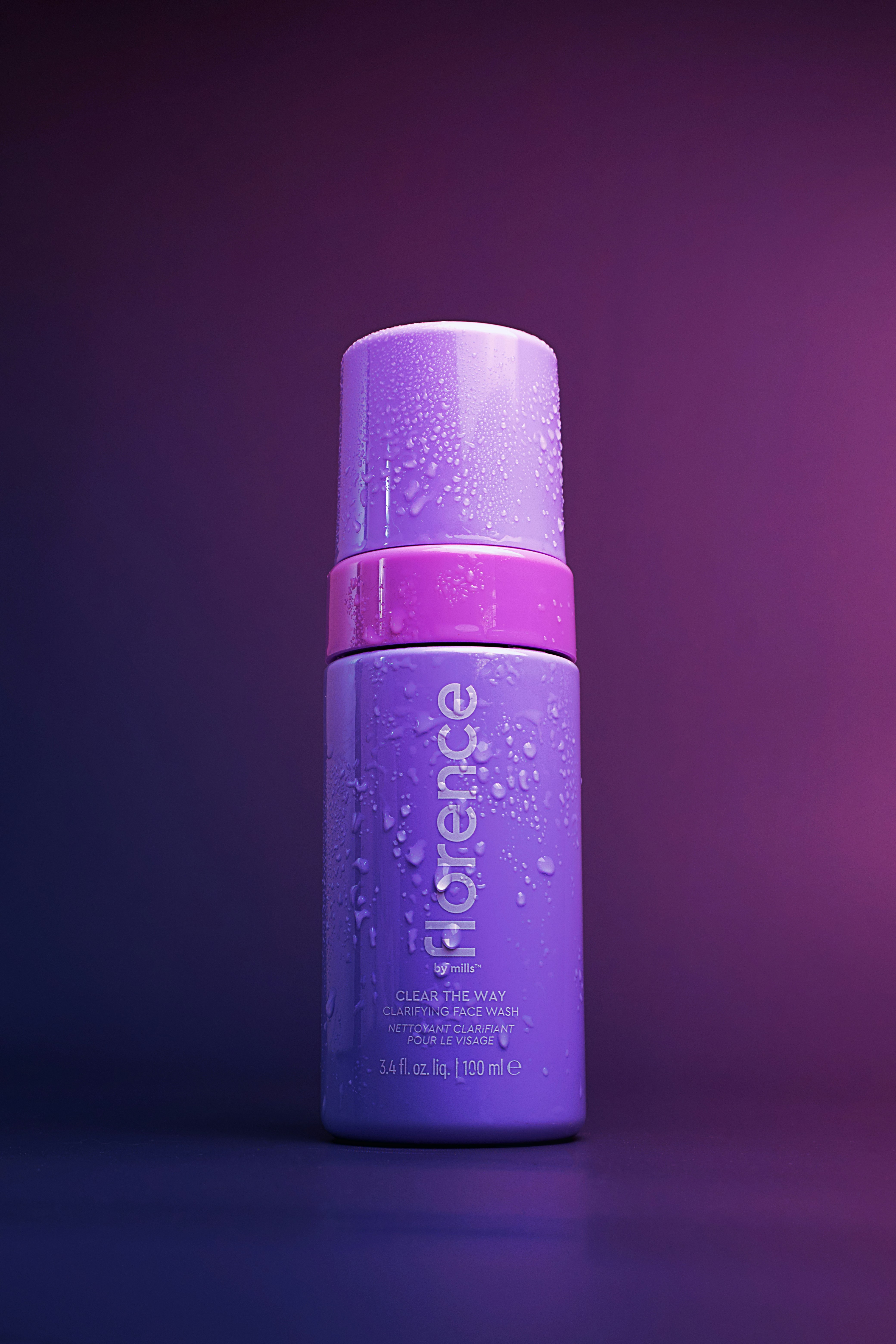 A bottle of deodorant on a purple background photo – Free Usa Image on ...