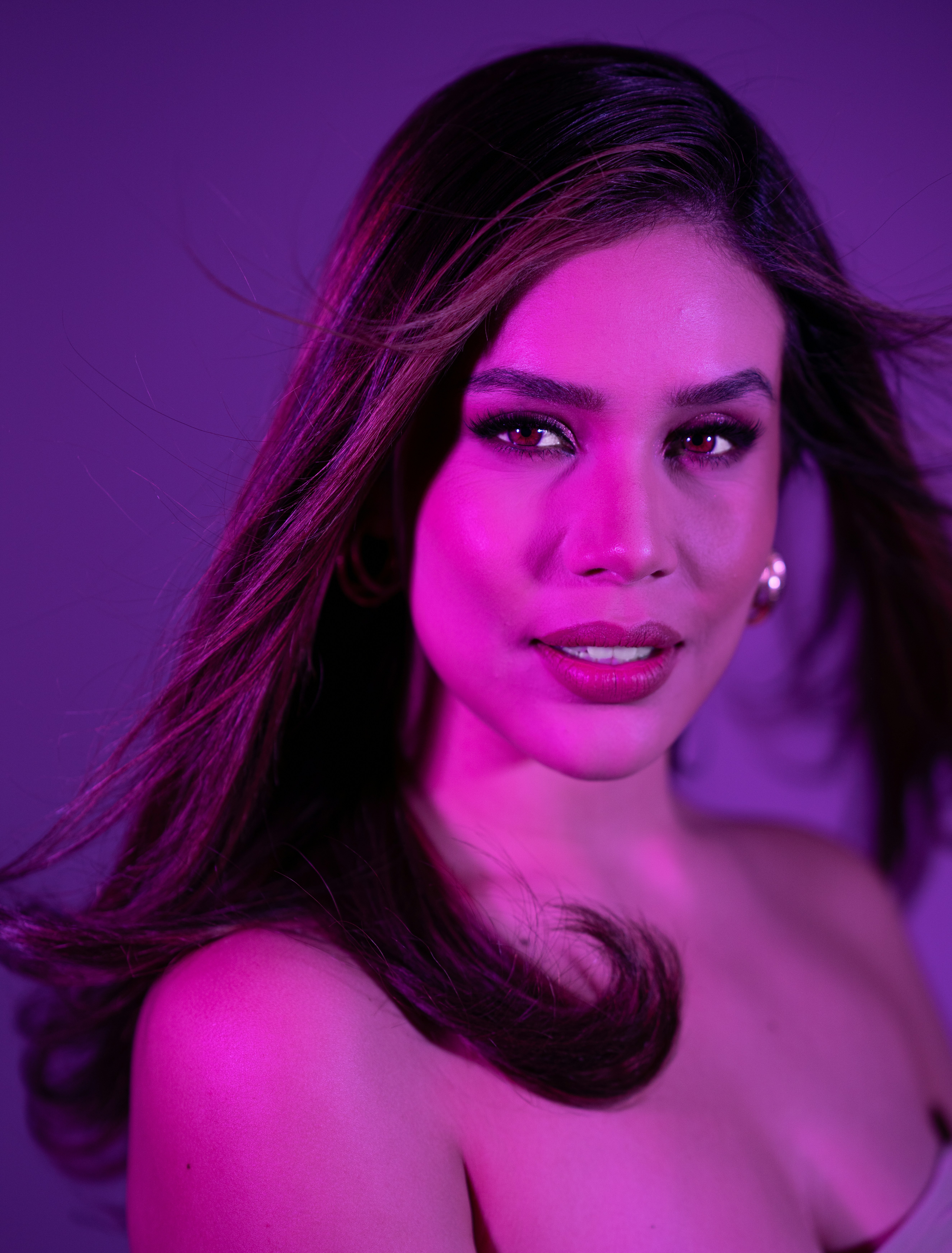 Magenta Silhouette: A Portrait Framed in Neon Velvet
