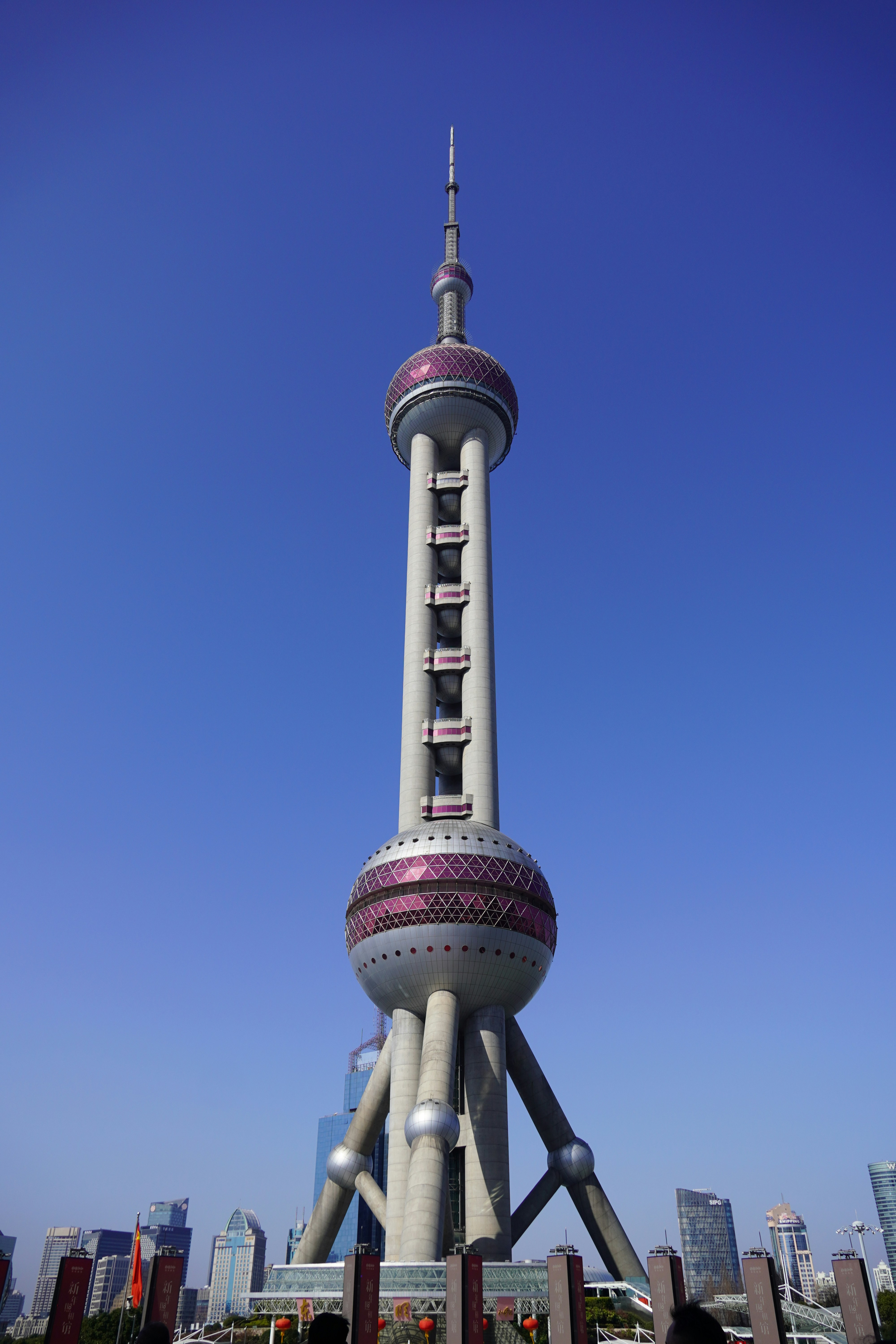 A very tall building with a very tall tower photo – Free Architecture ...