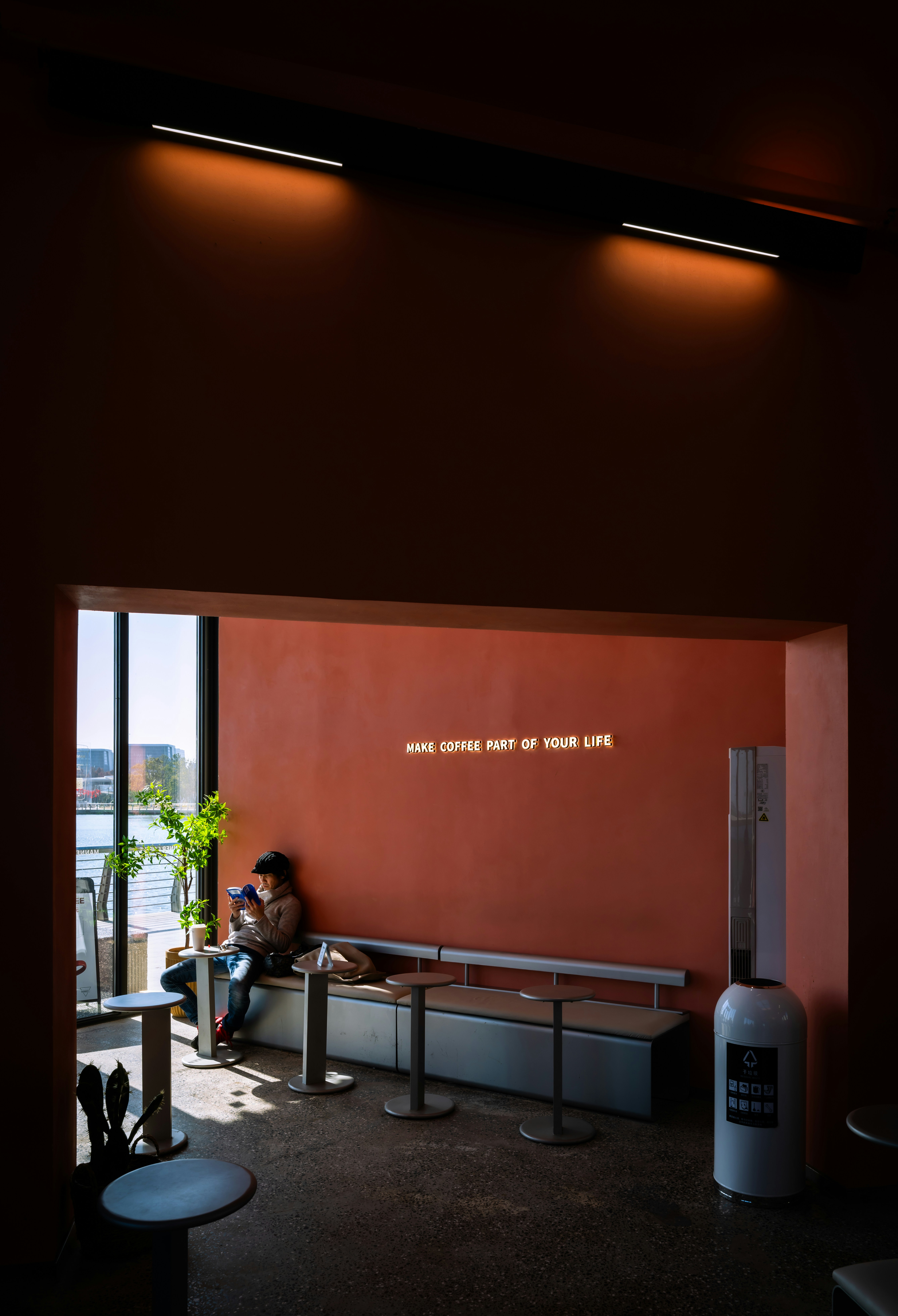 Terracotta Glow: A Quiet Moment by the Window