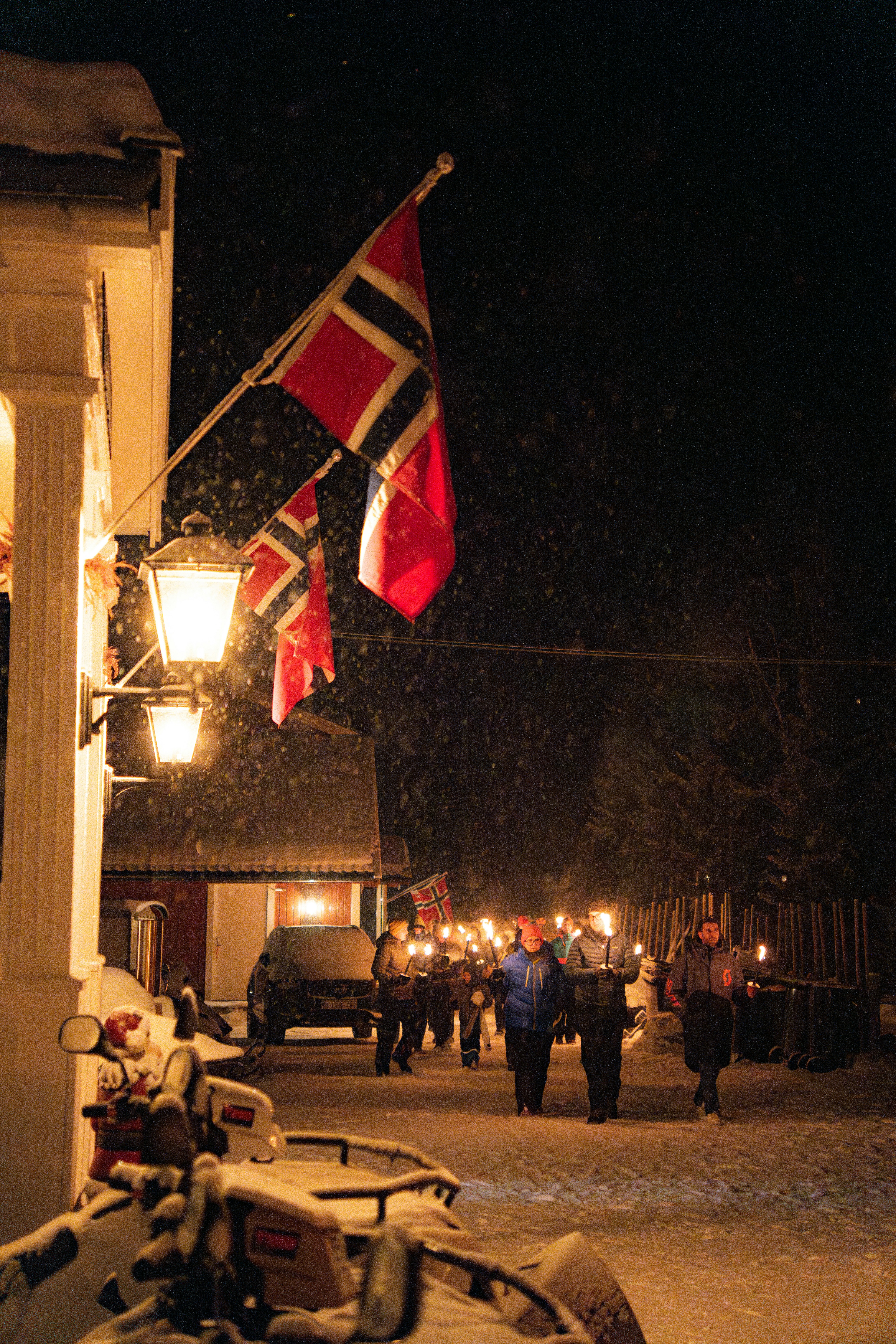 Midnight Torch Parade Under Norwegian Flags