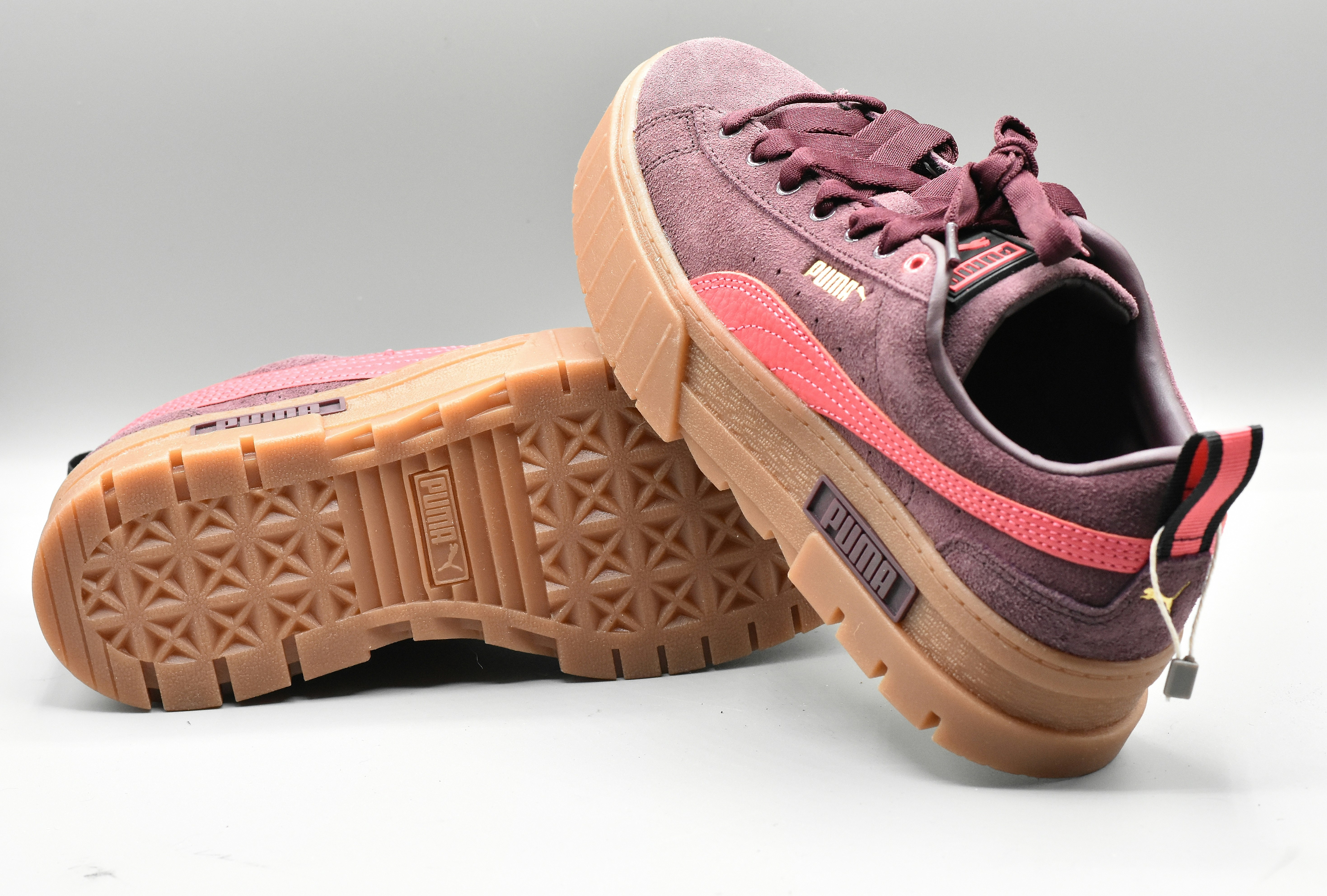 Rugged Mauve Sneaker Duet: Textured Outsole and Curved Silhouette