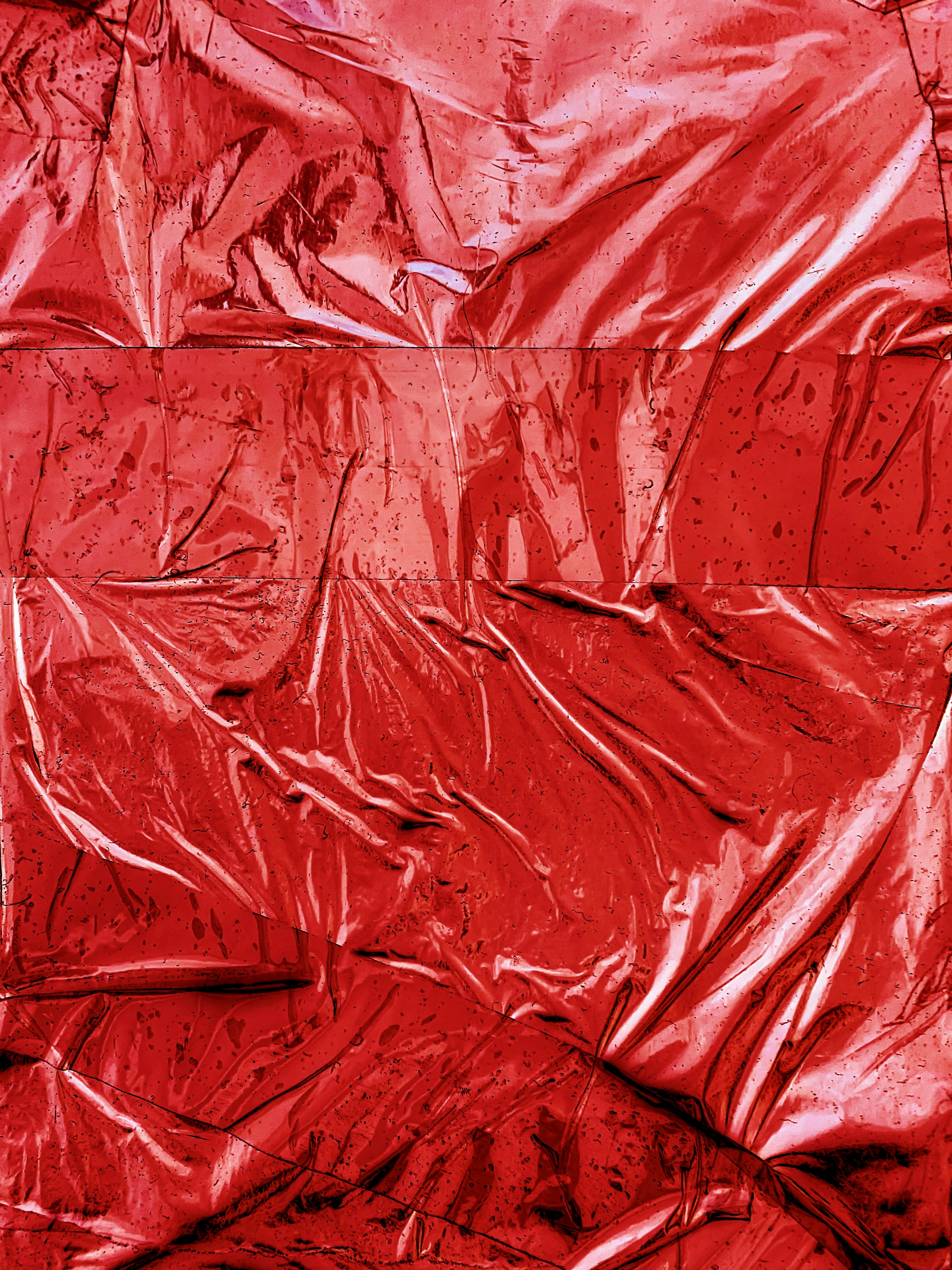 A close up of a red plastic bag photo – Free Wallpaper Image on Unsplash