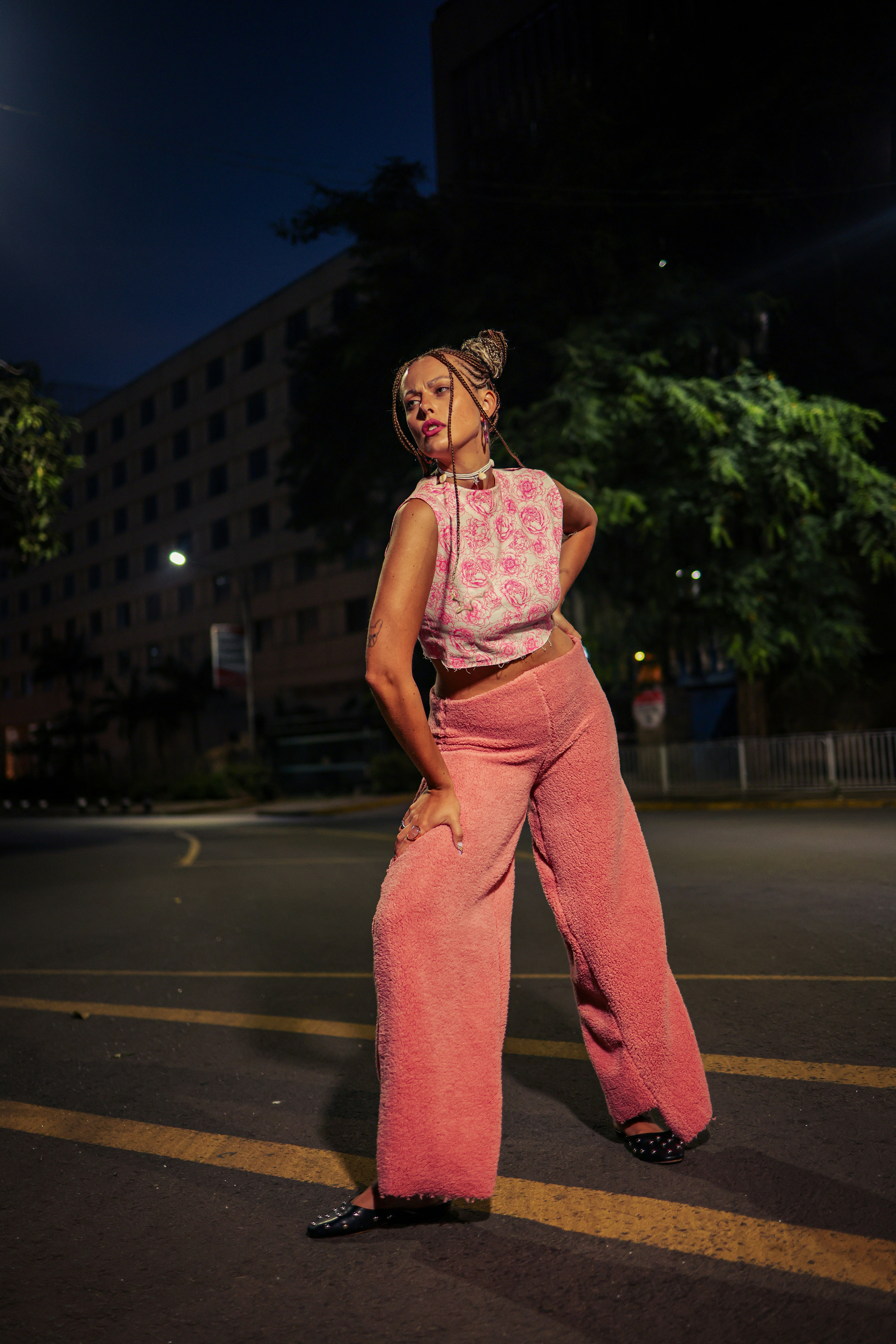 Pink Velvet Steps: A Night Portrait in Neon Streetlight