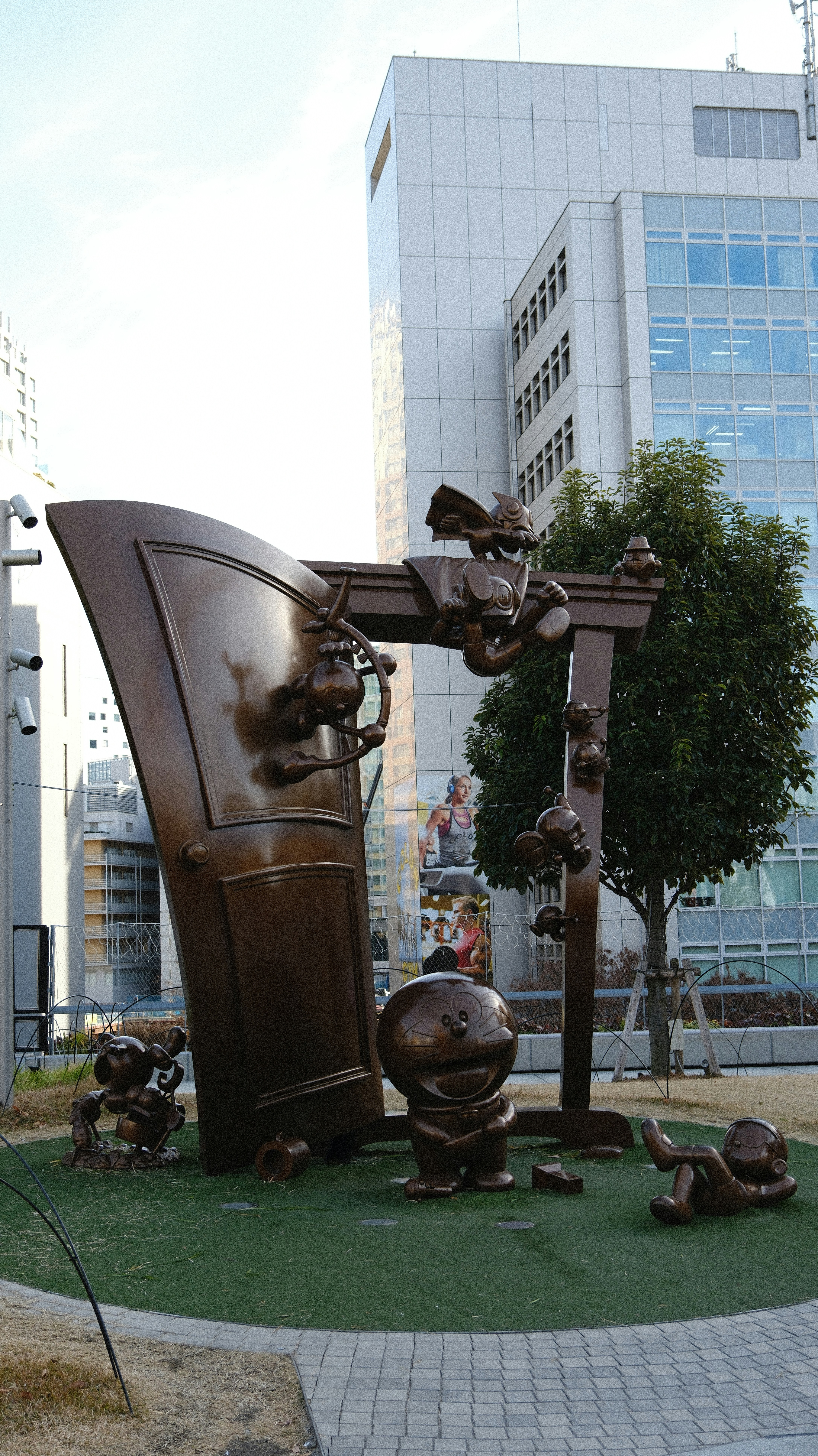 Bronze Doorframe Playground in a Modern City Plaza
