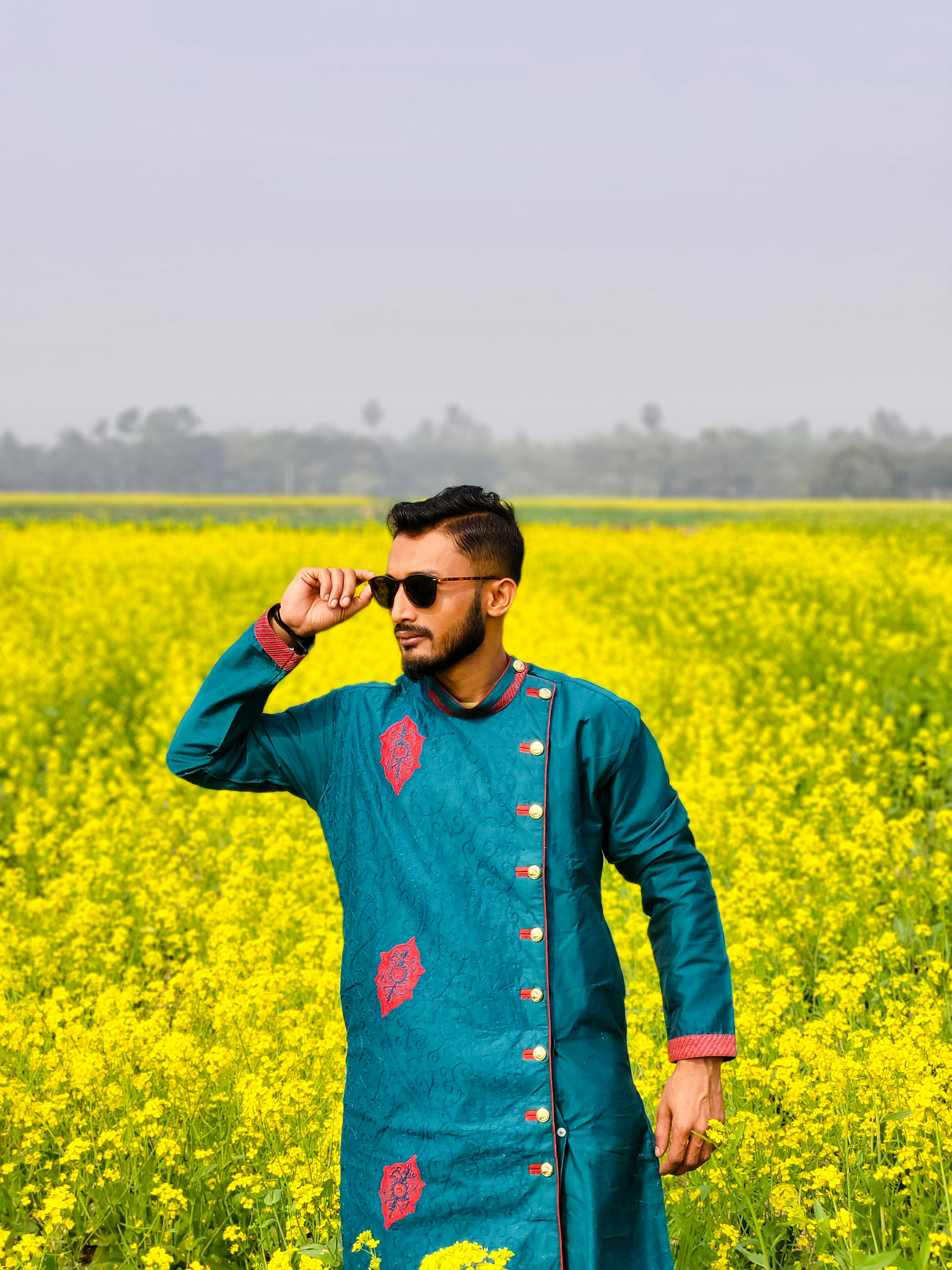Azure Portrait Amid a Canola Sea
