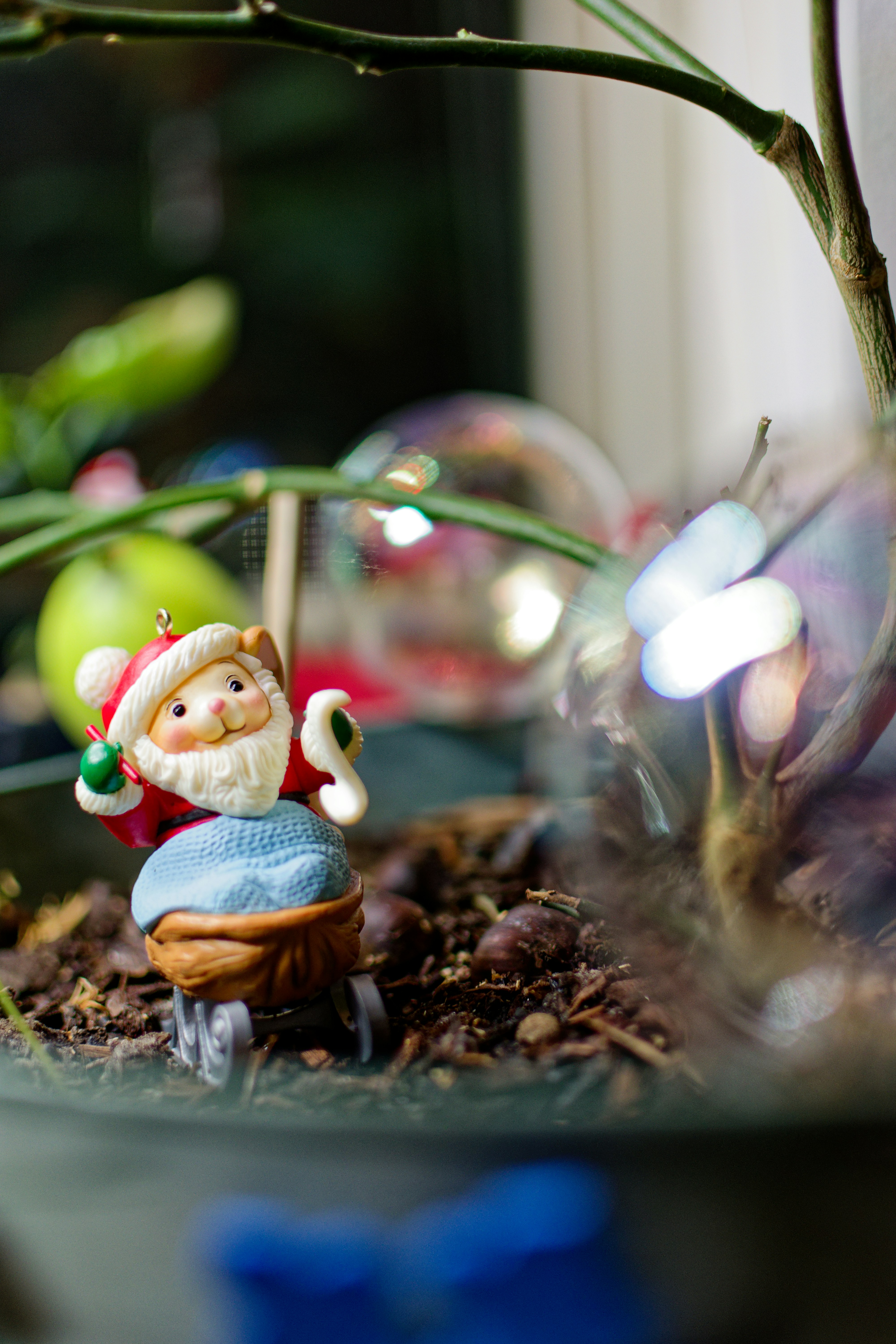 Tiny Santa, Big Focus: A Playful Startup Moment among Glass Orbs