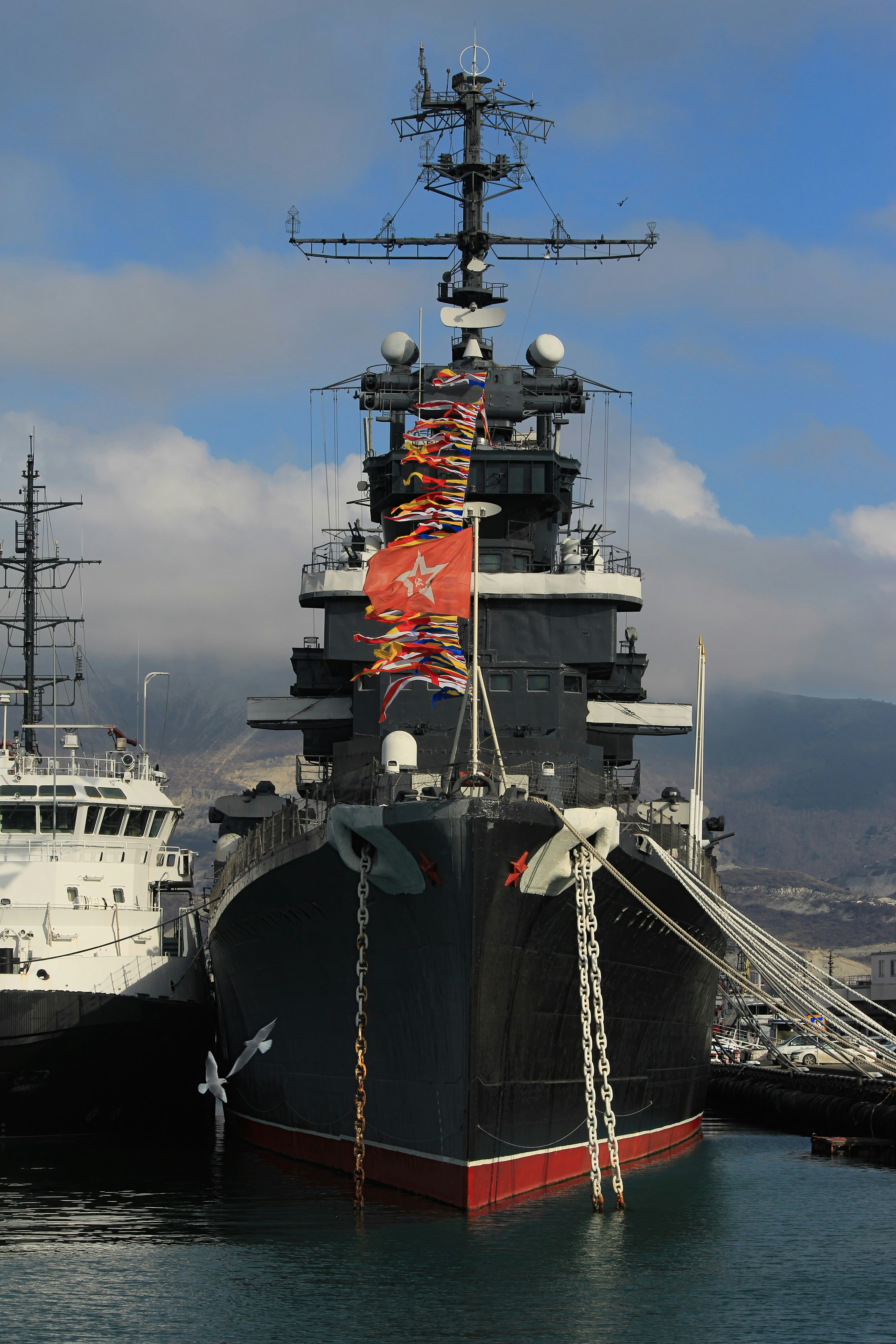 Flags on the Bow: A Harborside Portrait of a Battleship