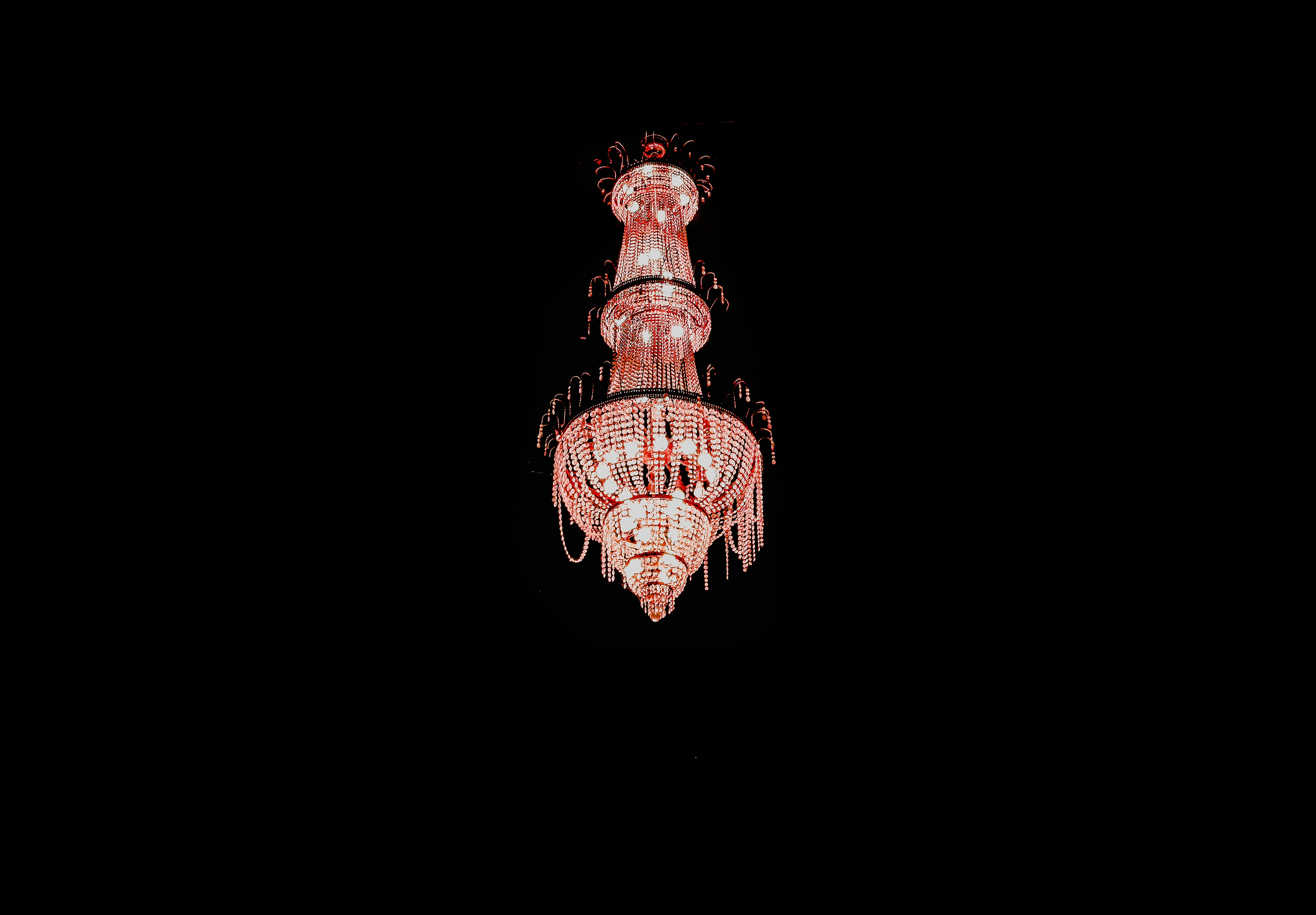 Crimson Crystal Chandelier Suspended in Velvet Black