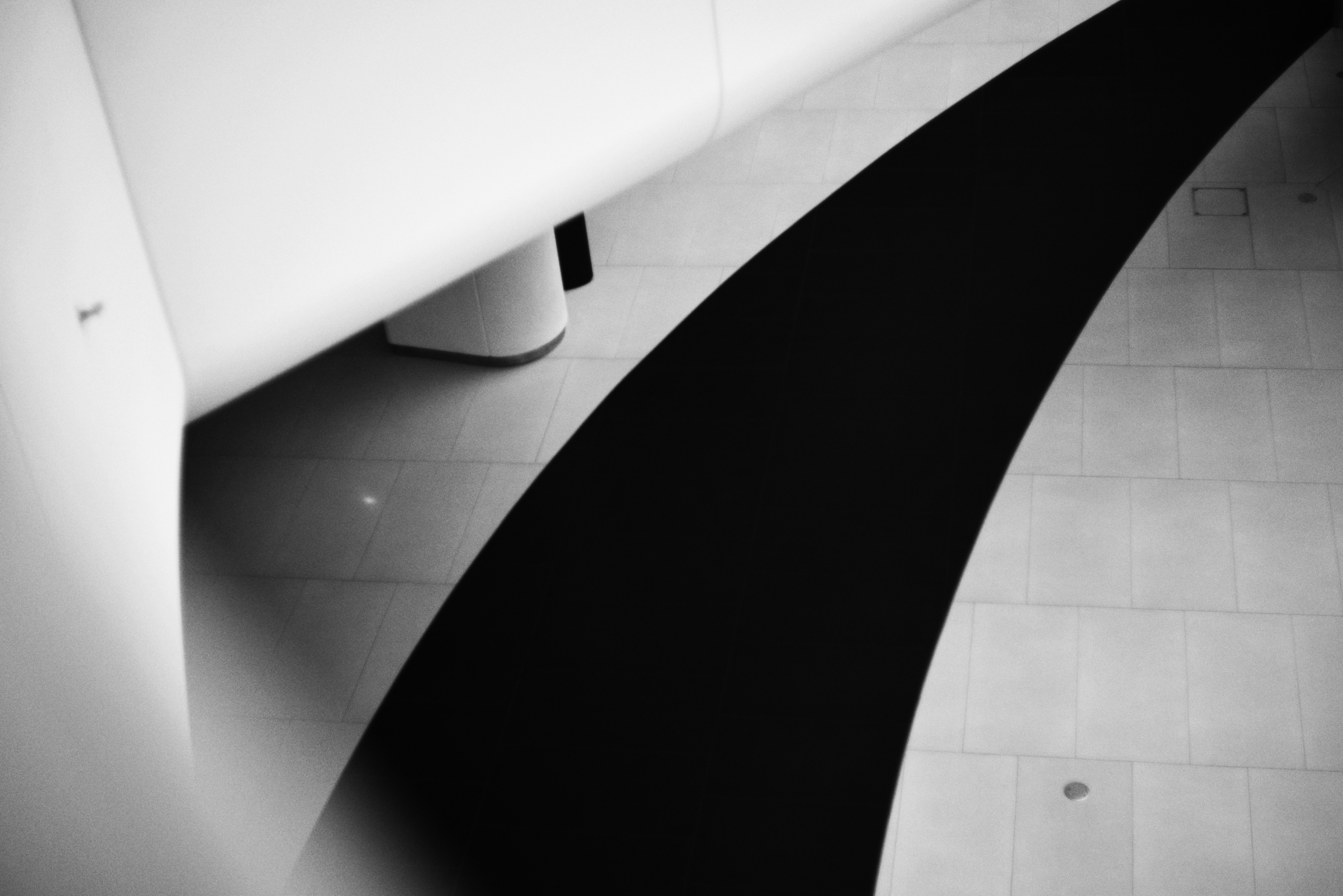Black Ribbon over Tile: A Monochrome Architecture Study