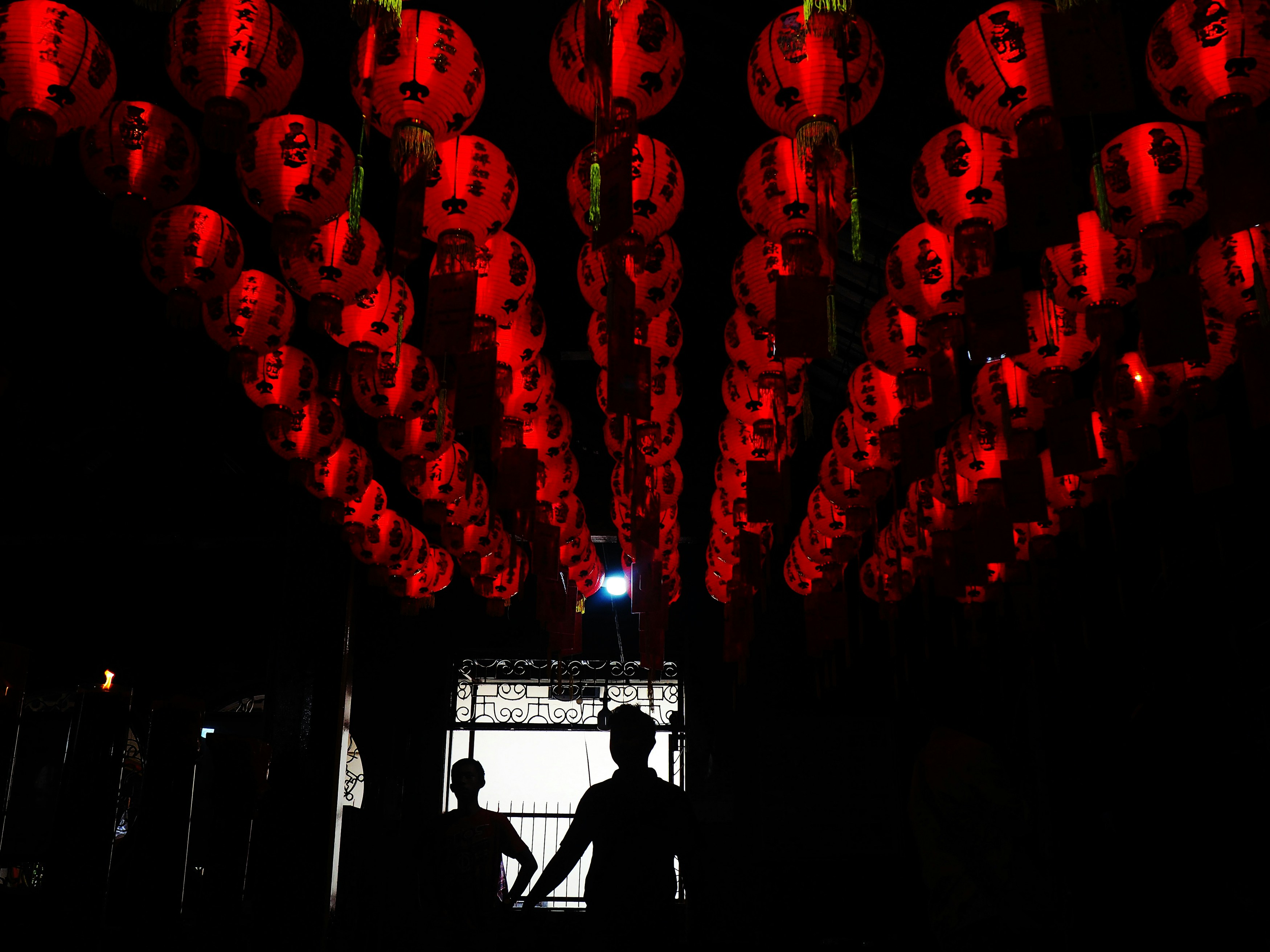 Lantern Glow in Shadowed Pathway