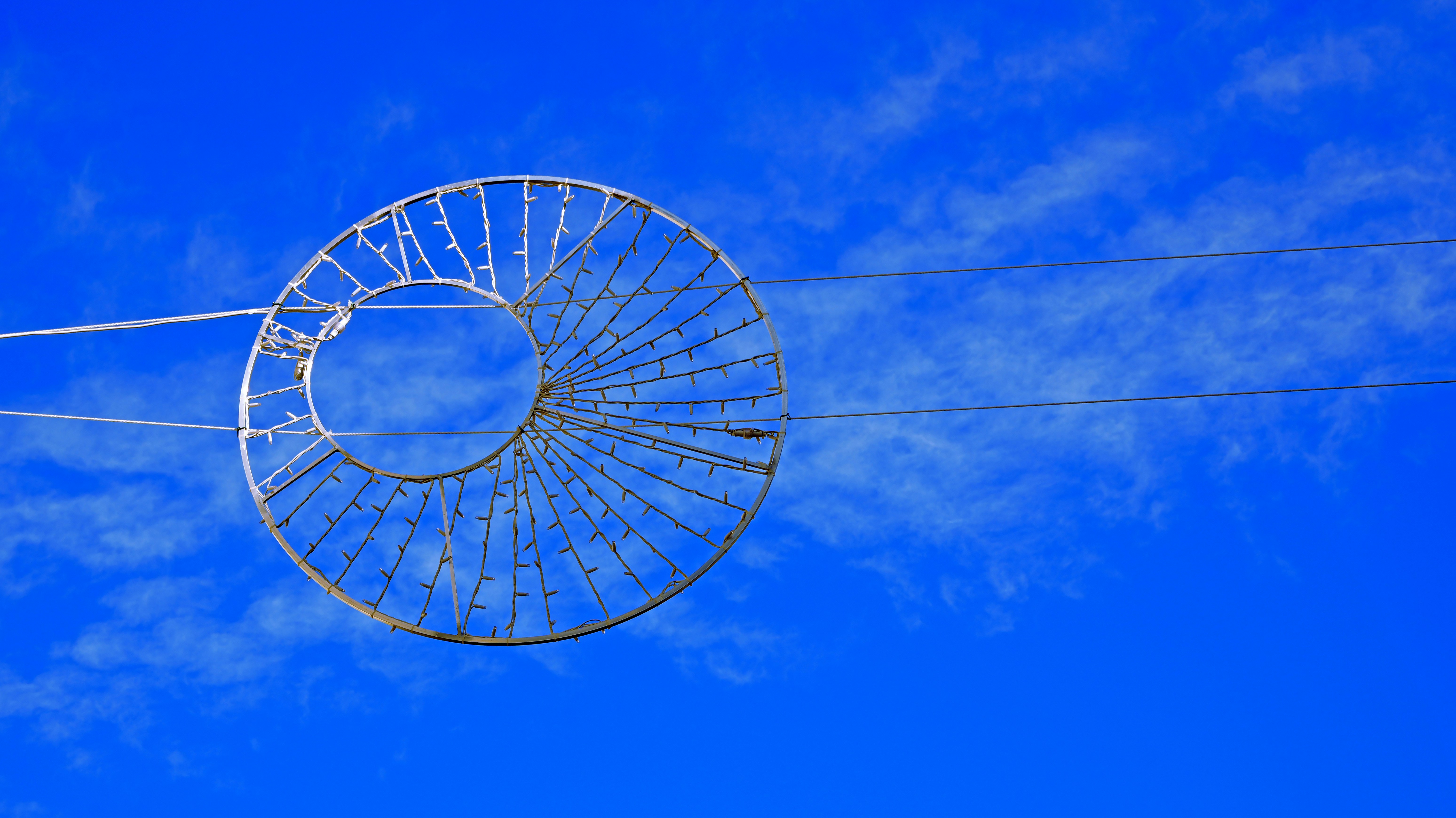 The Suspended Ring Against a Cerulean Sky