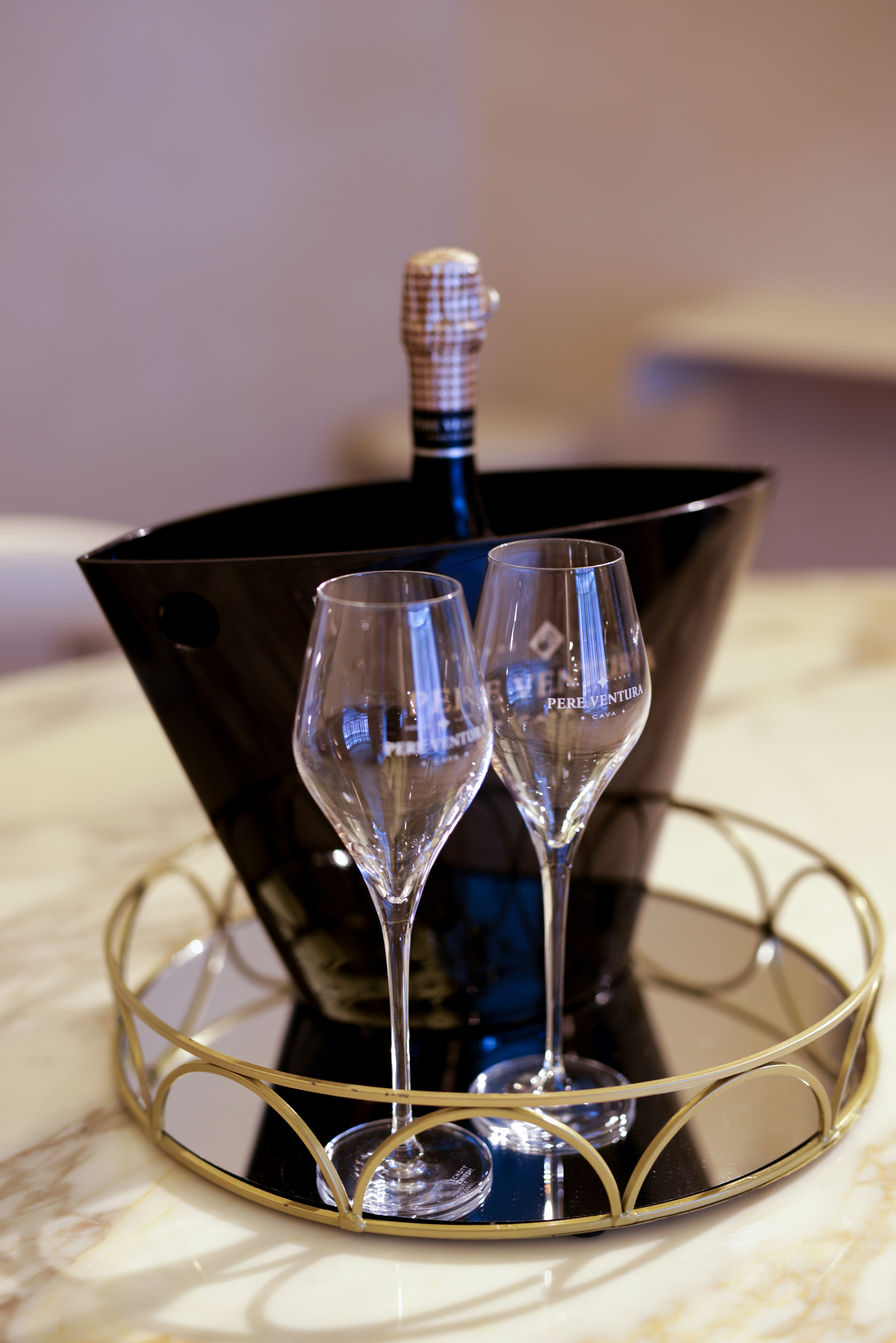 Champagne Glasses and Bottle on a Gold Tray