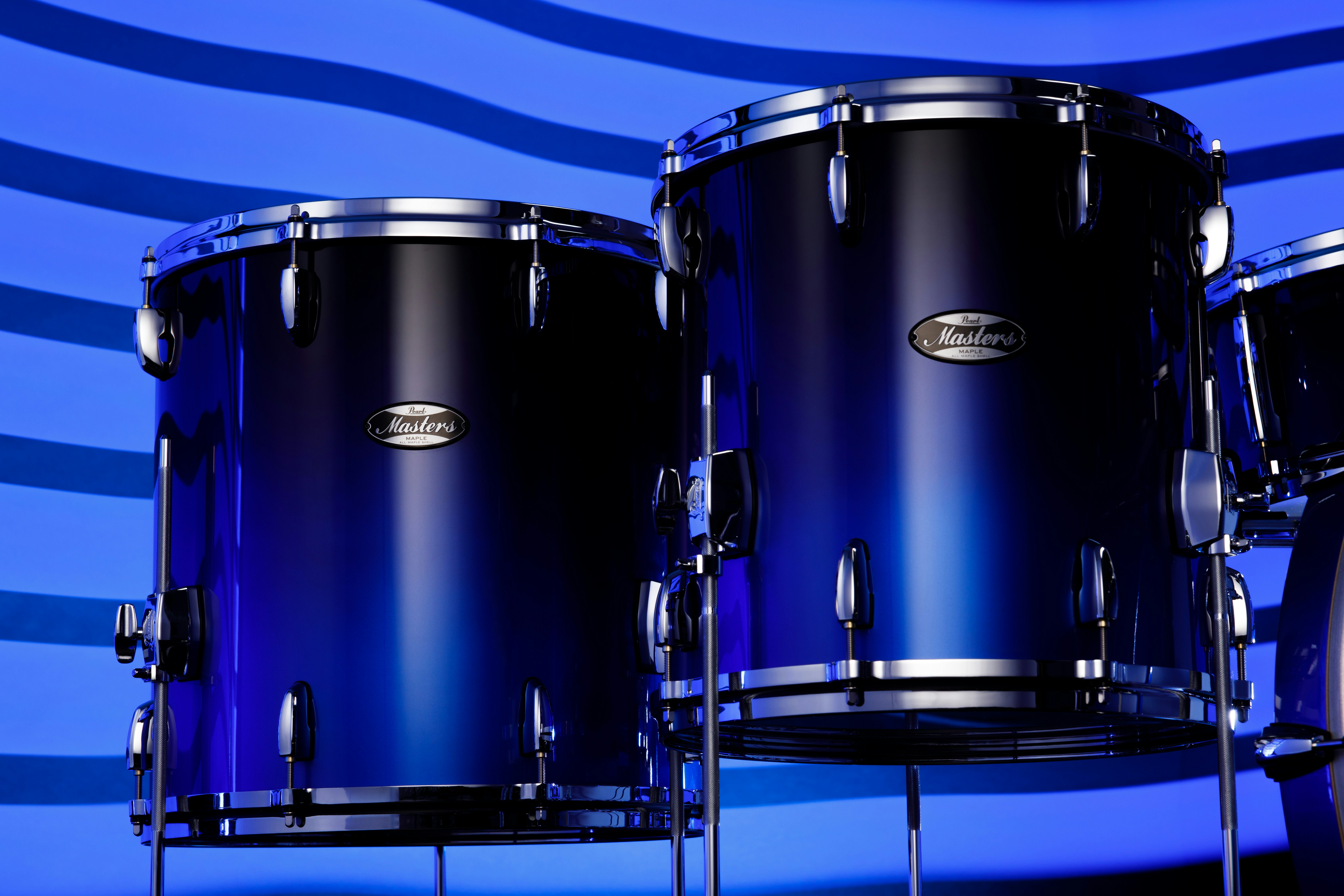 A blue drum set sitting on top of a stage photo – Free Musical ...