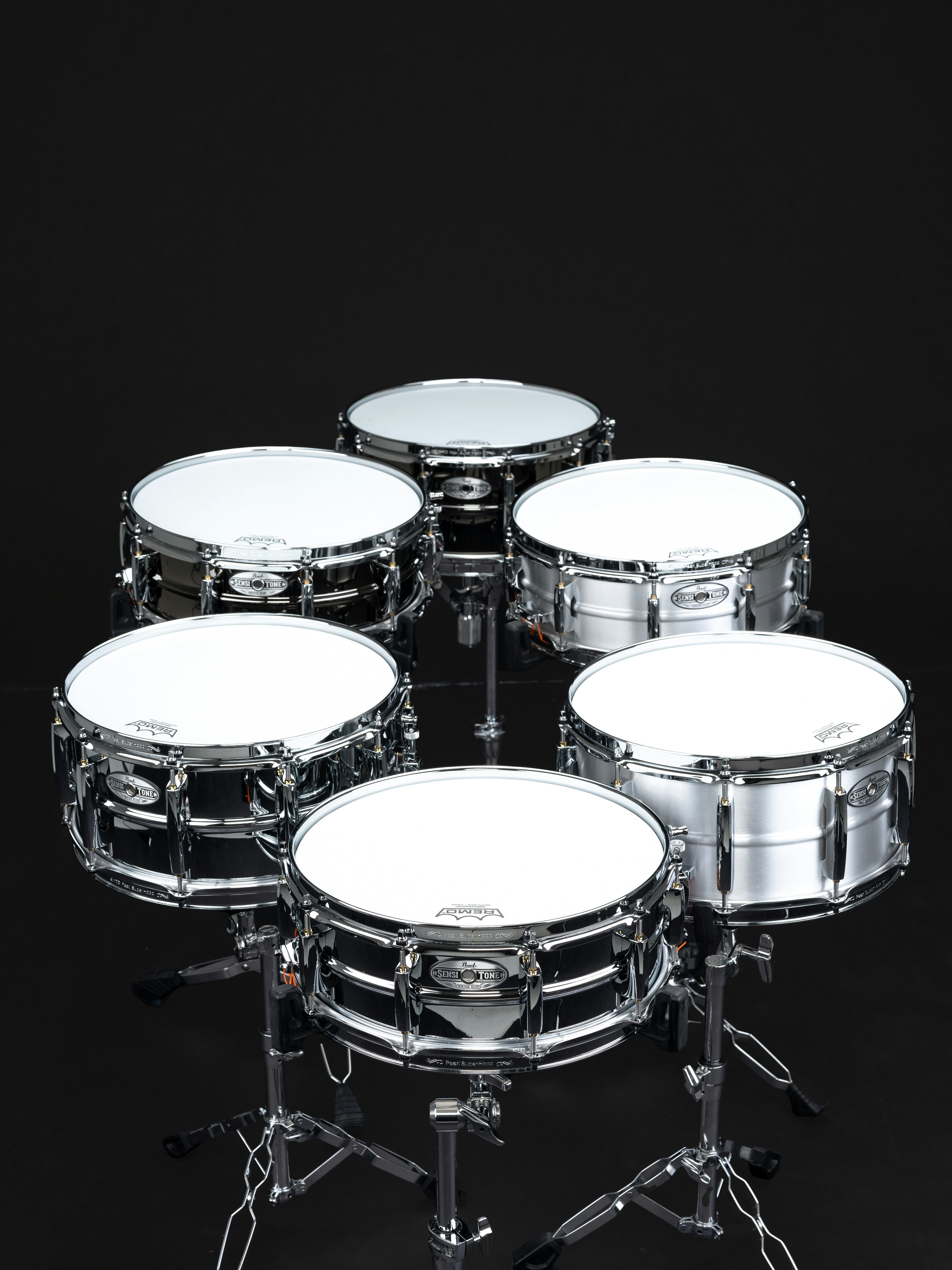 A group of drums sitting on top of each other photo – Free Snare drum ...