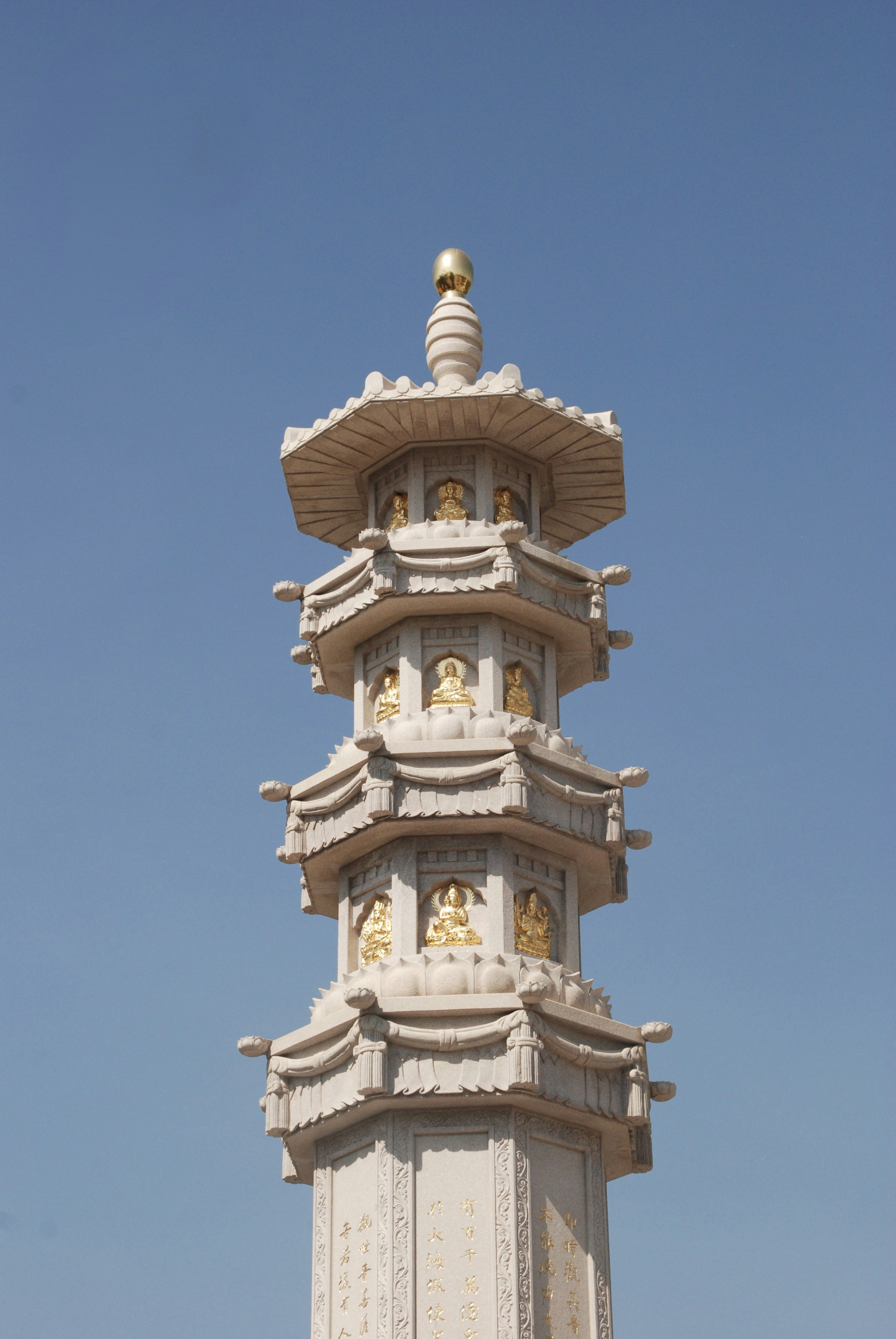 Luminous Tiered Pagoda Against a Clear Blue Sky