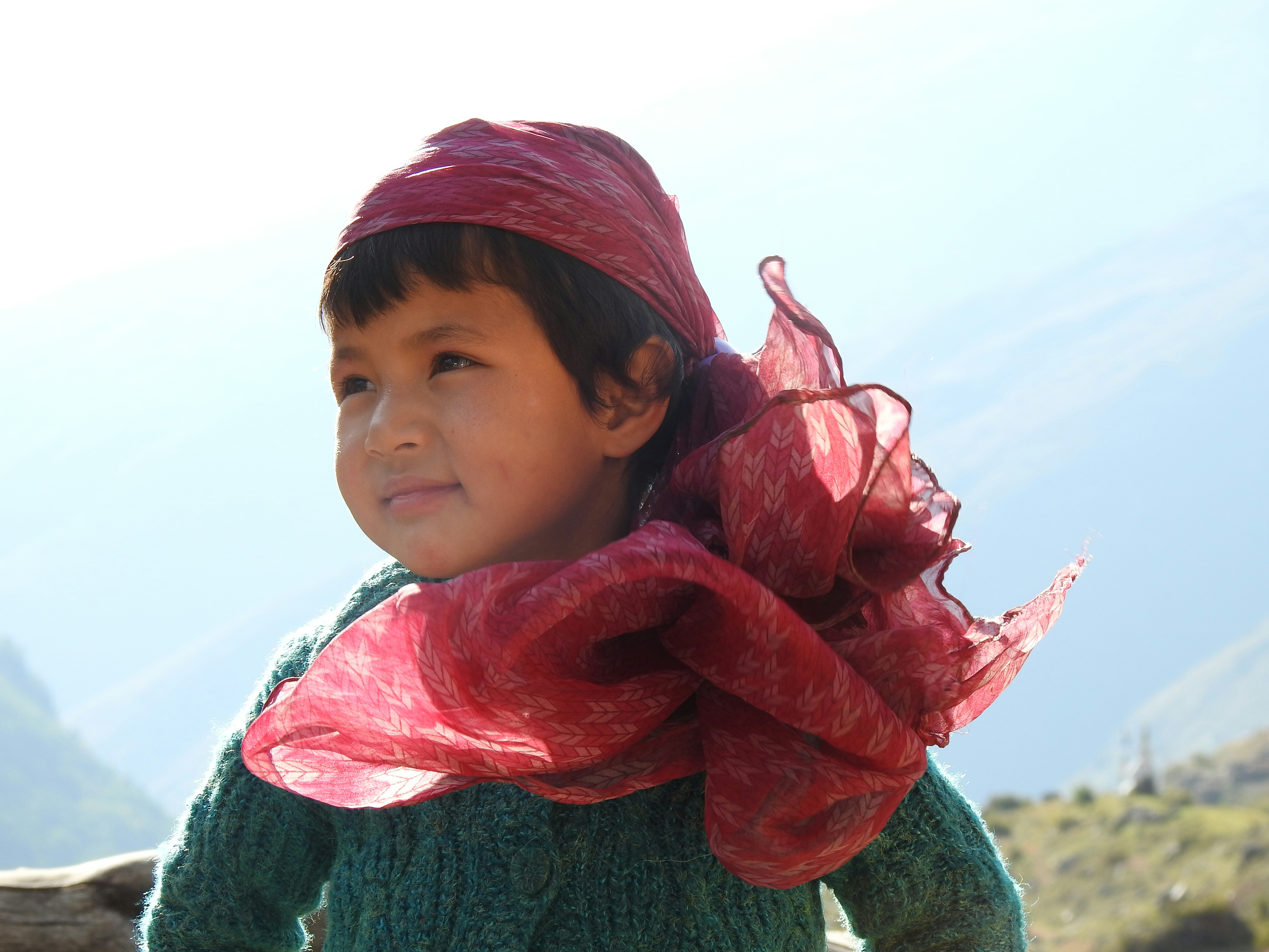 A young girl with a red scarf around her neck photo – Free Travel Image ...