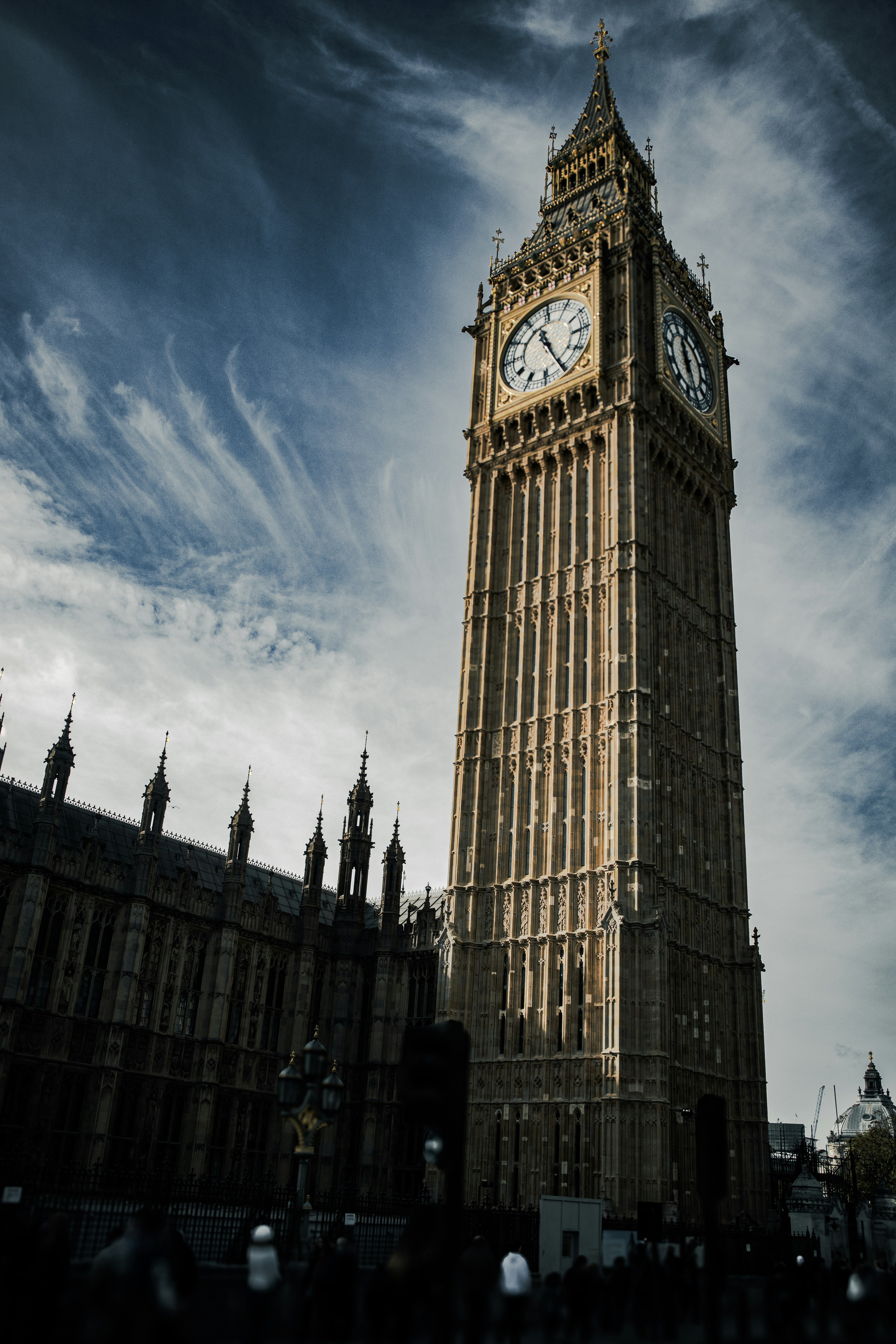 A tall clock tower towering over a city photo – Free City Image on Unsplash