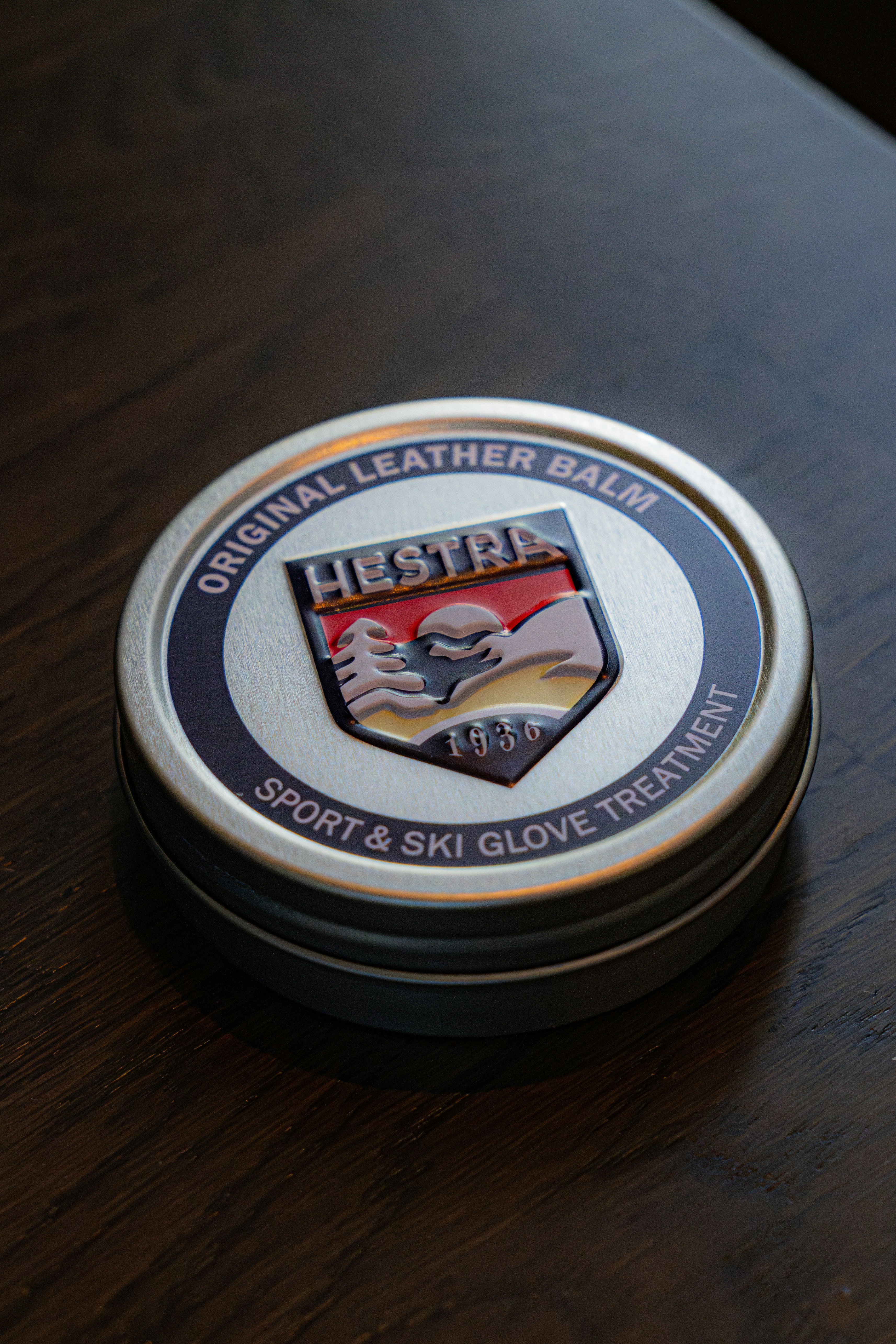 A hockey puck sitting on top of a wooden table