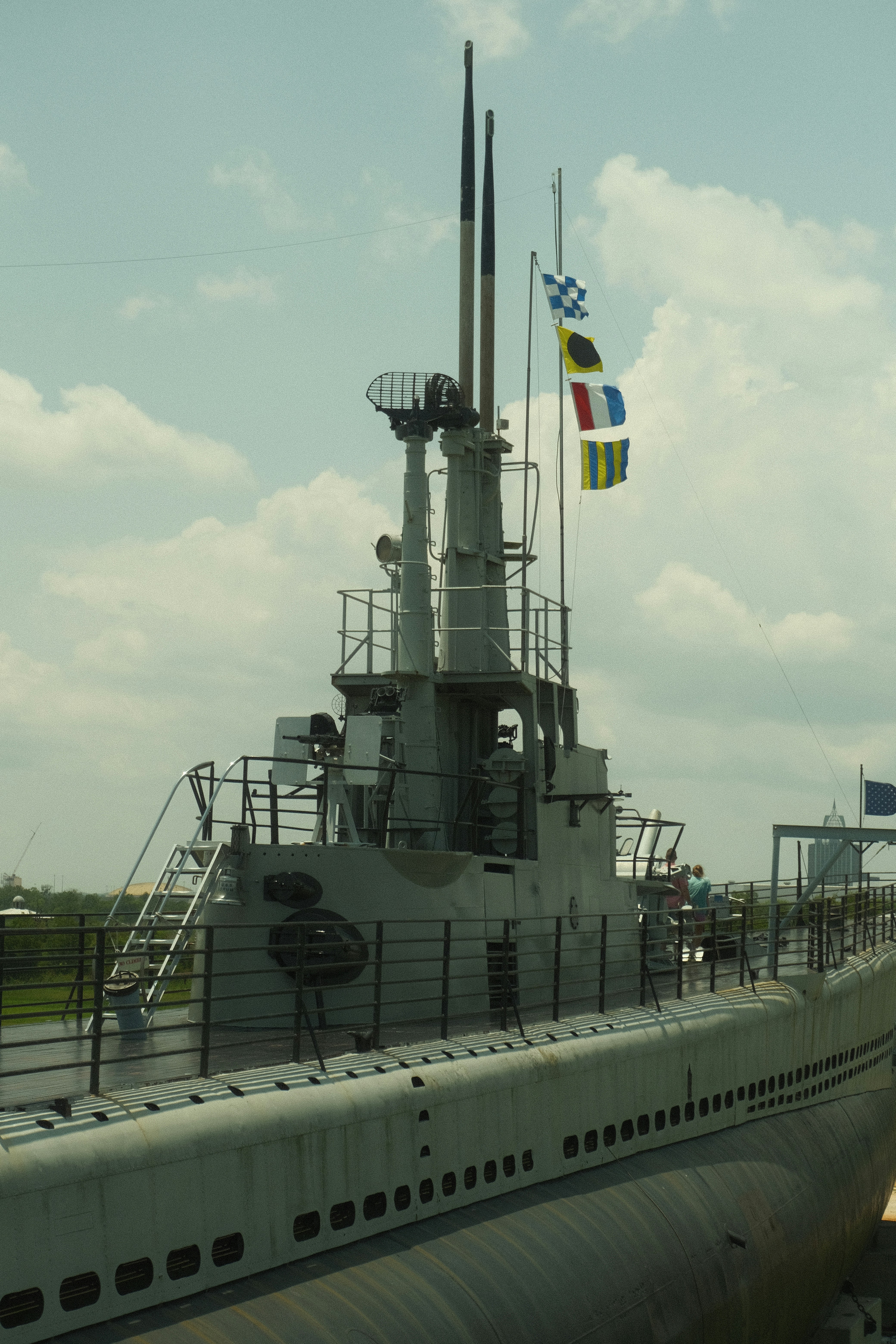 A large battleship sitting on top of a body of water photo – Free ...
