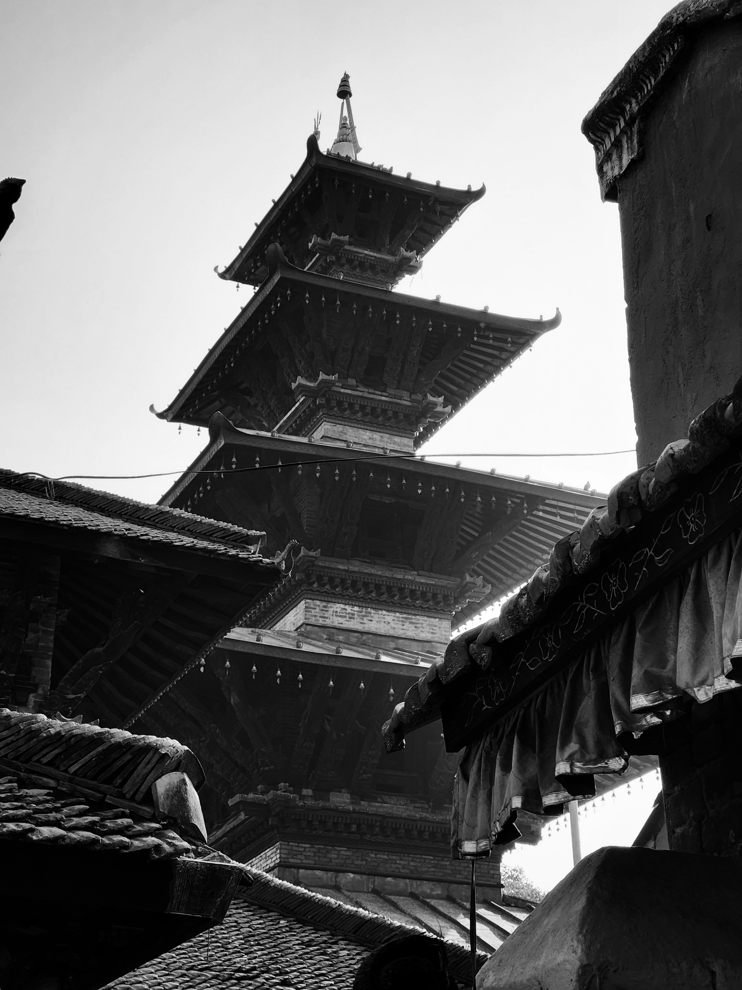 A black and white photo of a tall building