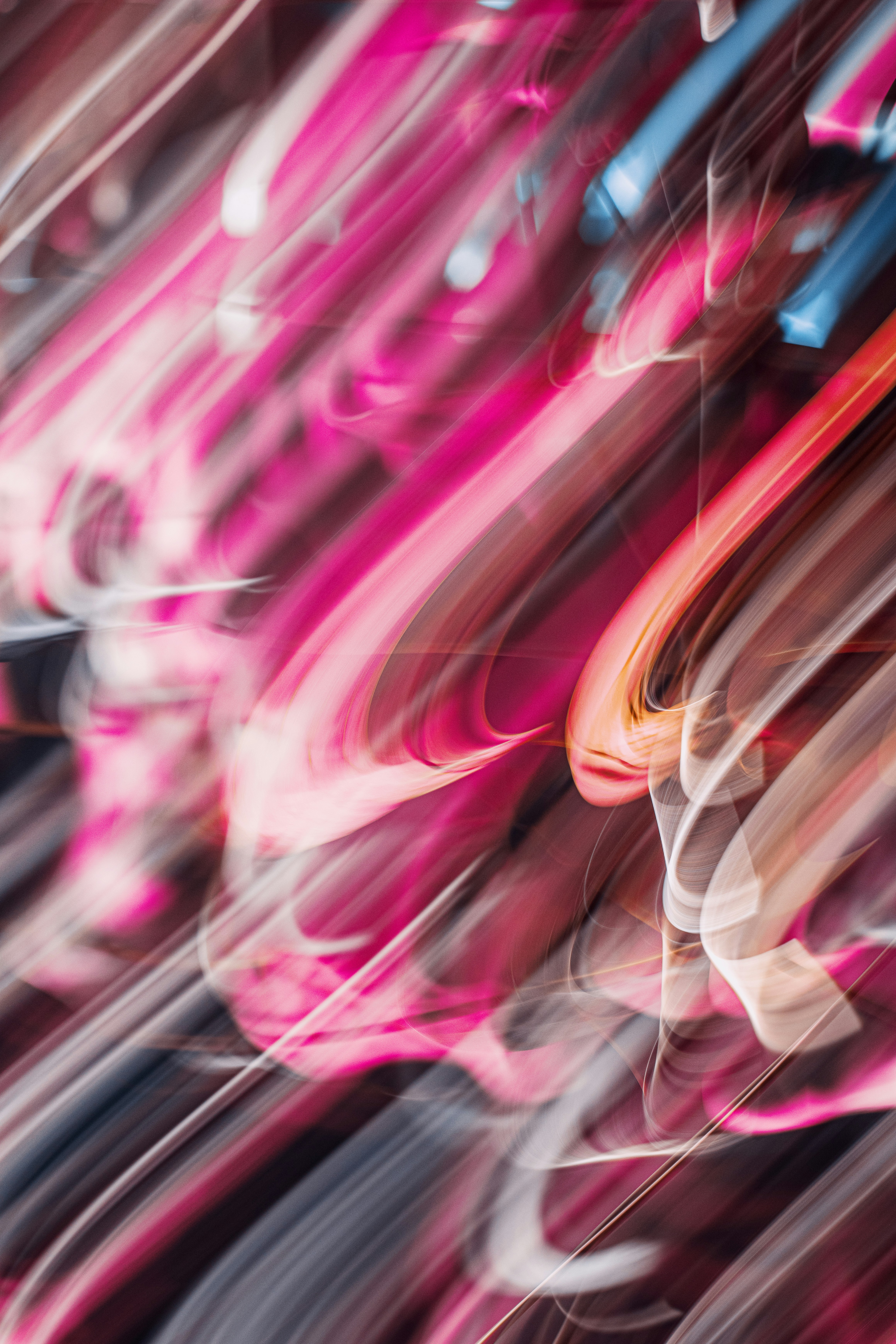 A blurry photo of a bunch of different colored objects photo – Free Art ...