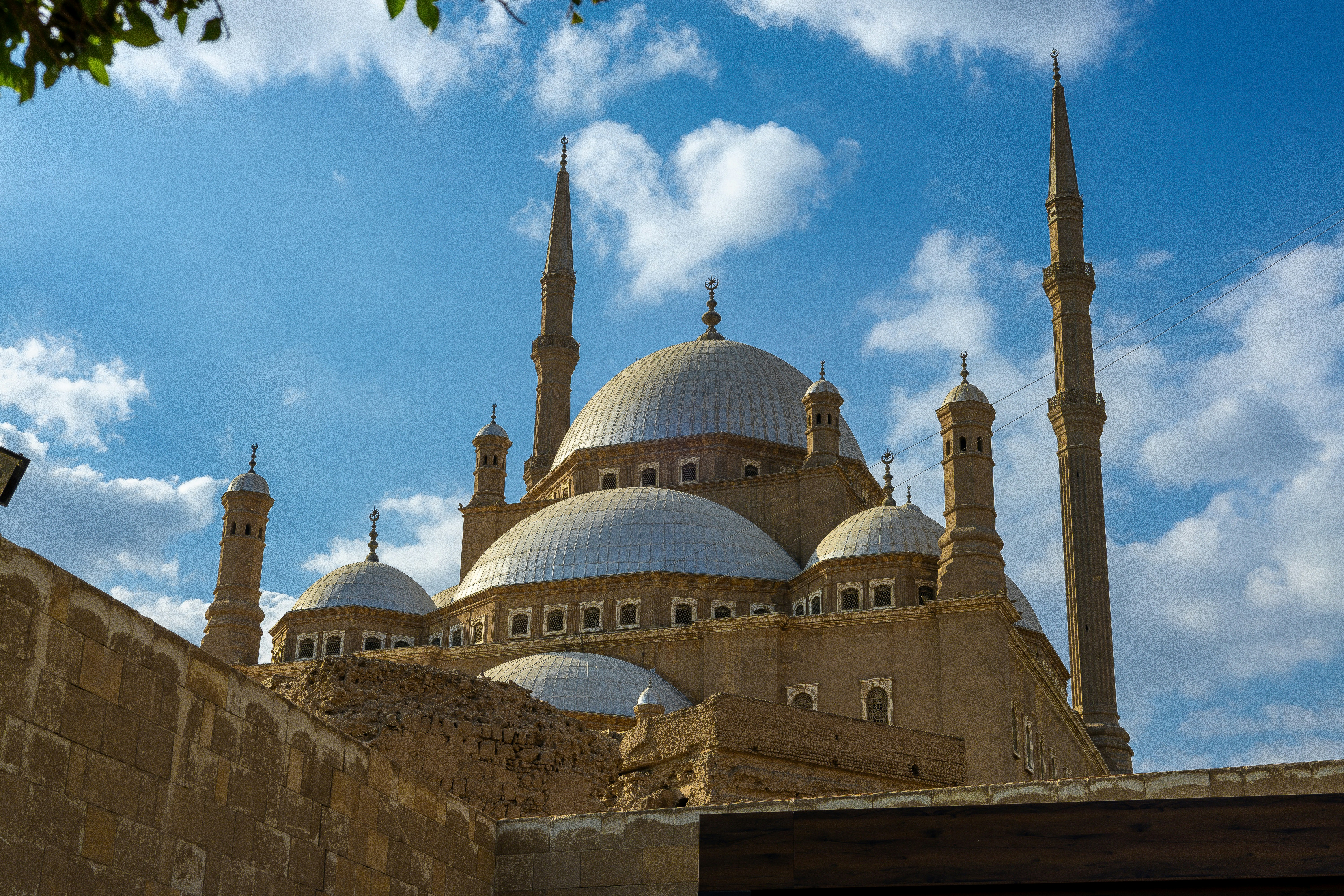 A picture of a very large building with many spires photo – Free ...