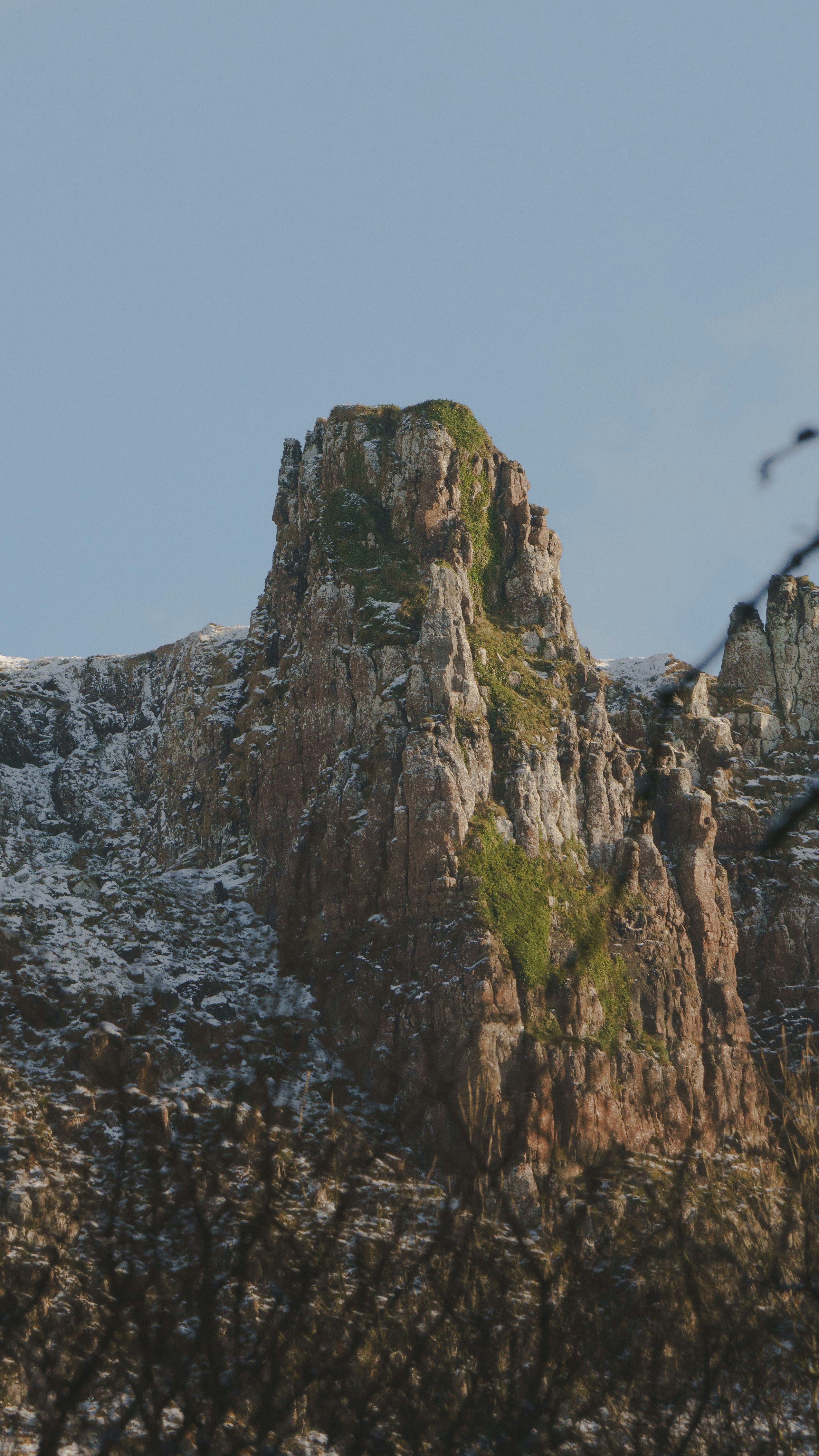 Granite Sentinel Rising Against a Clear Alpine Sky