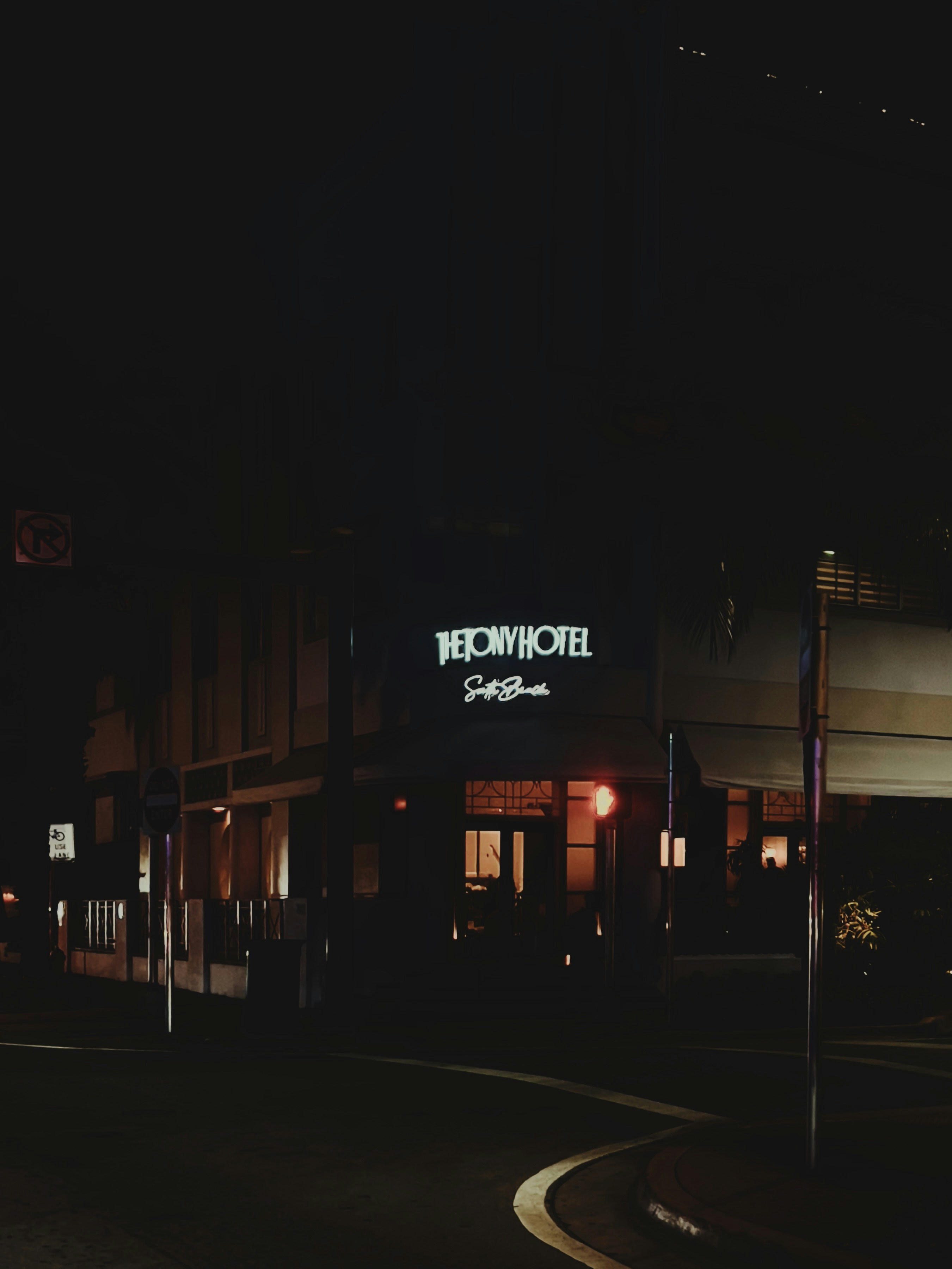 Neon Entrance: Quiet Night at the Tony Hotel