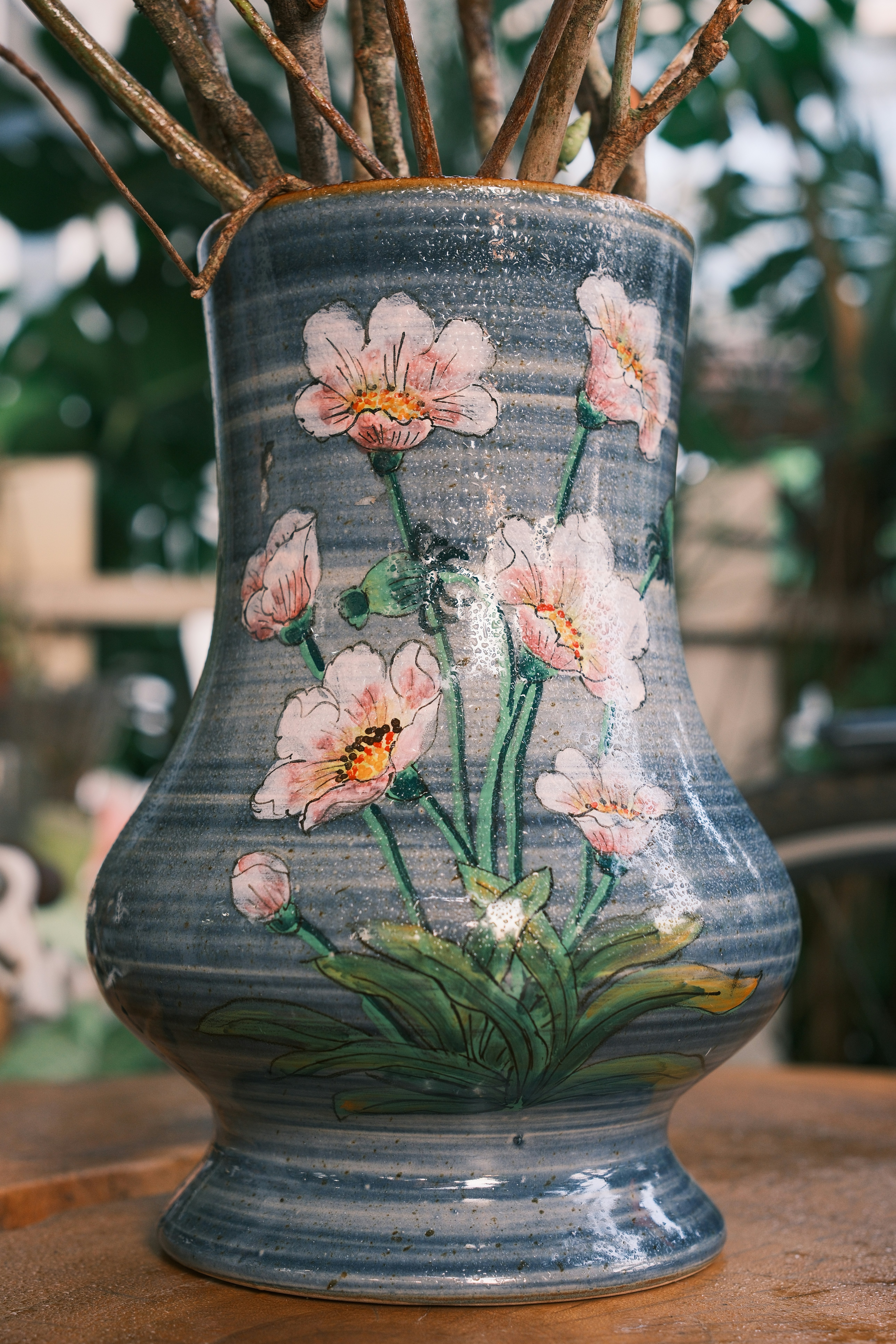 Blue-Glazed Vase with Pink Blooms: A Quiet Moment on a Wooden Table
