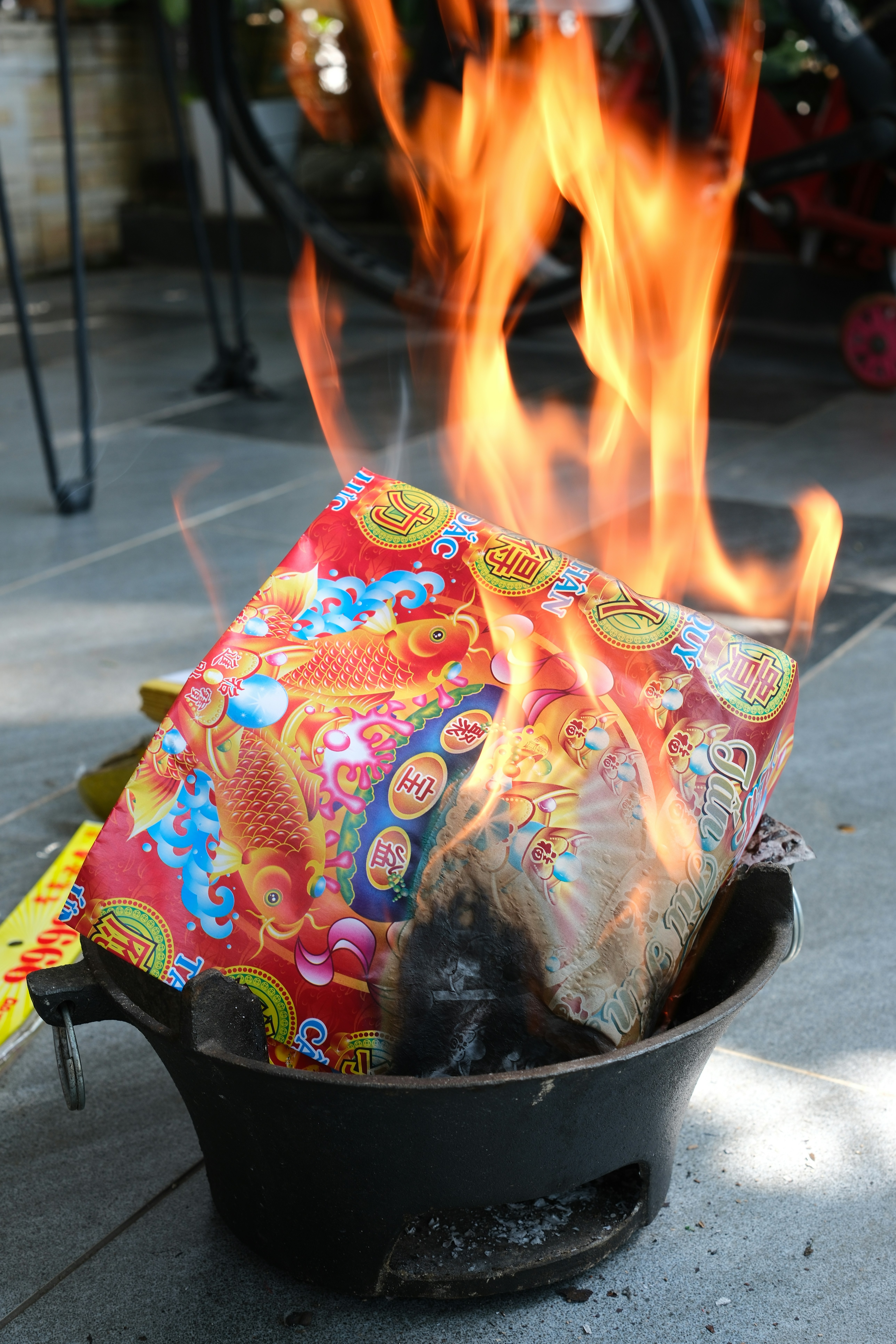 Dragon Emblem on Fire: A Festive Gift Box Ignites on Charcoal