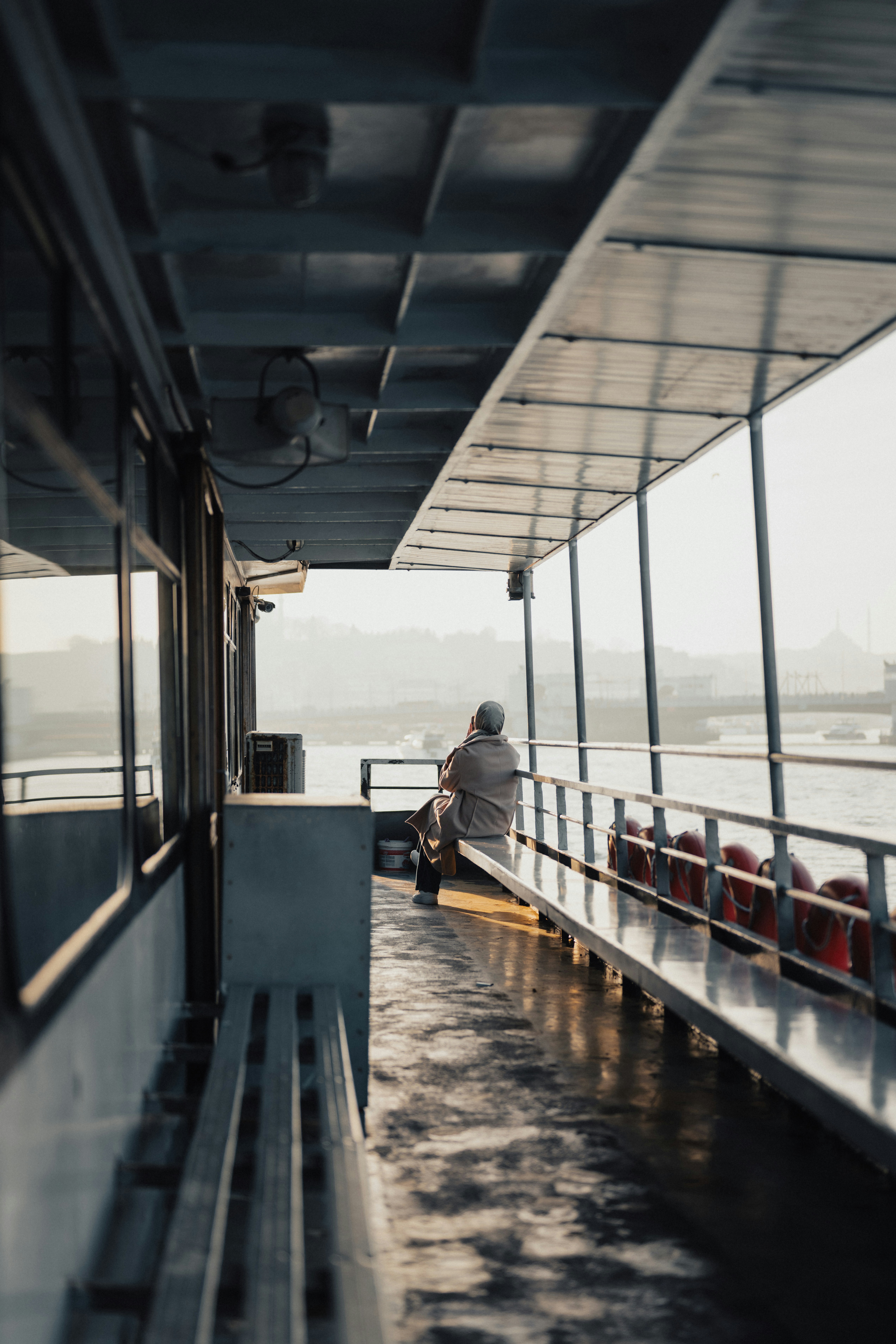 Solitary Moment on the River Ferry