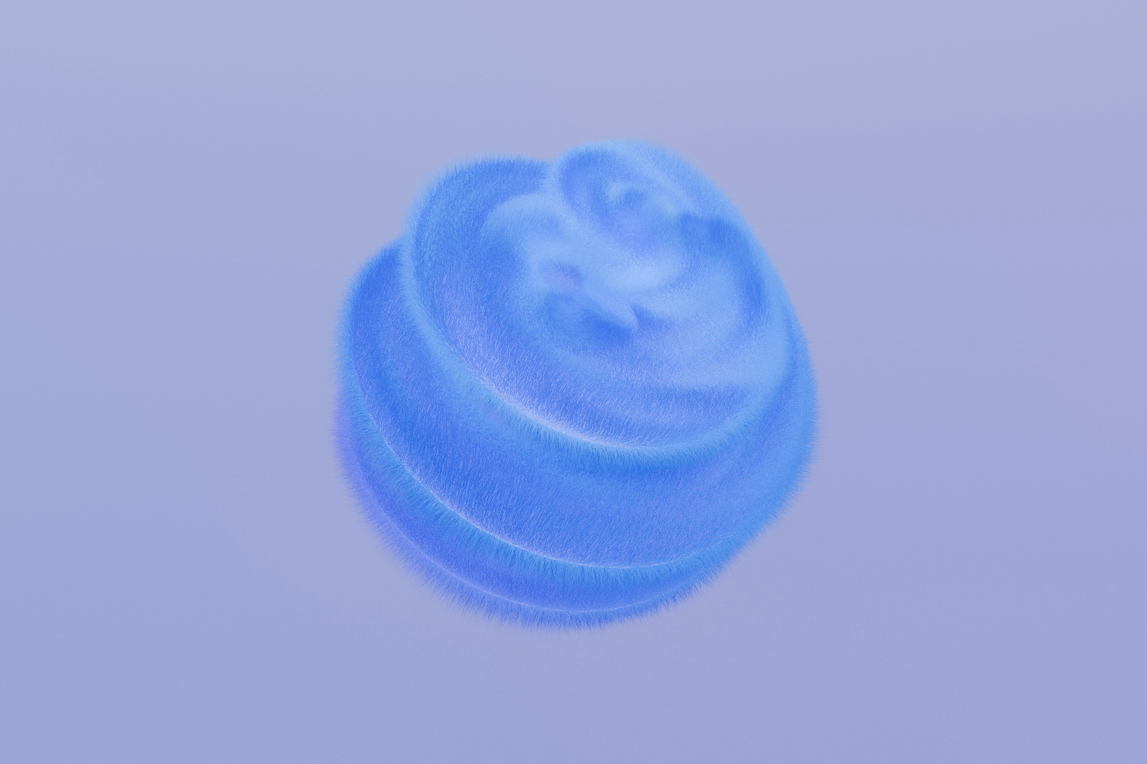 A close up of a blue button on a white background photo – Free ...