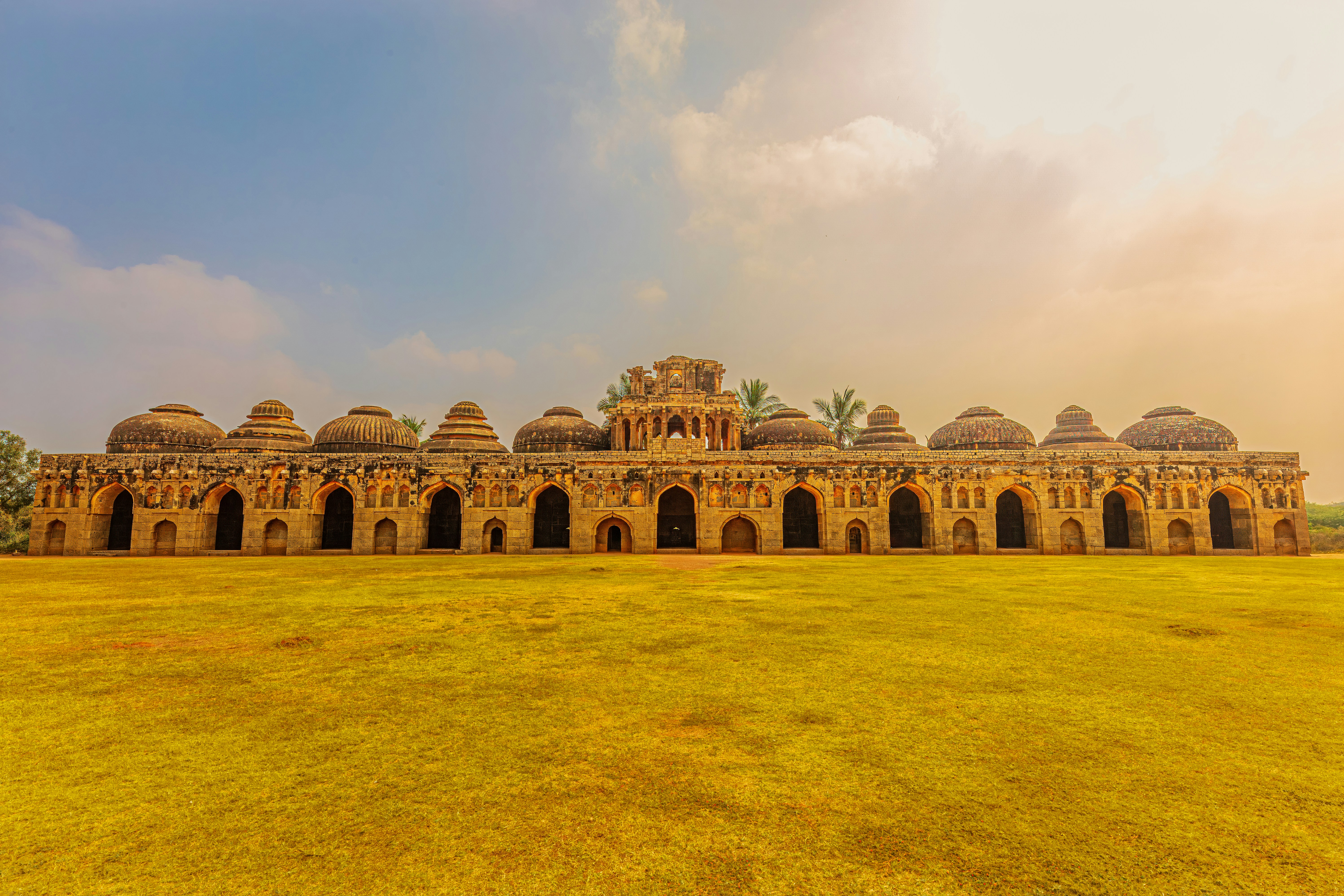 Domed Arcades Serenely Stretch Across a Sunlit Field