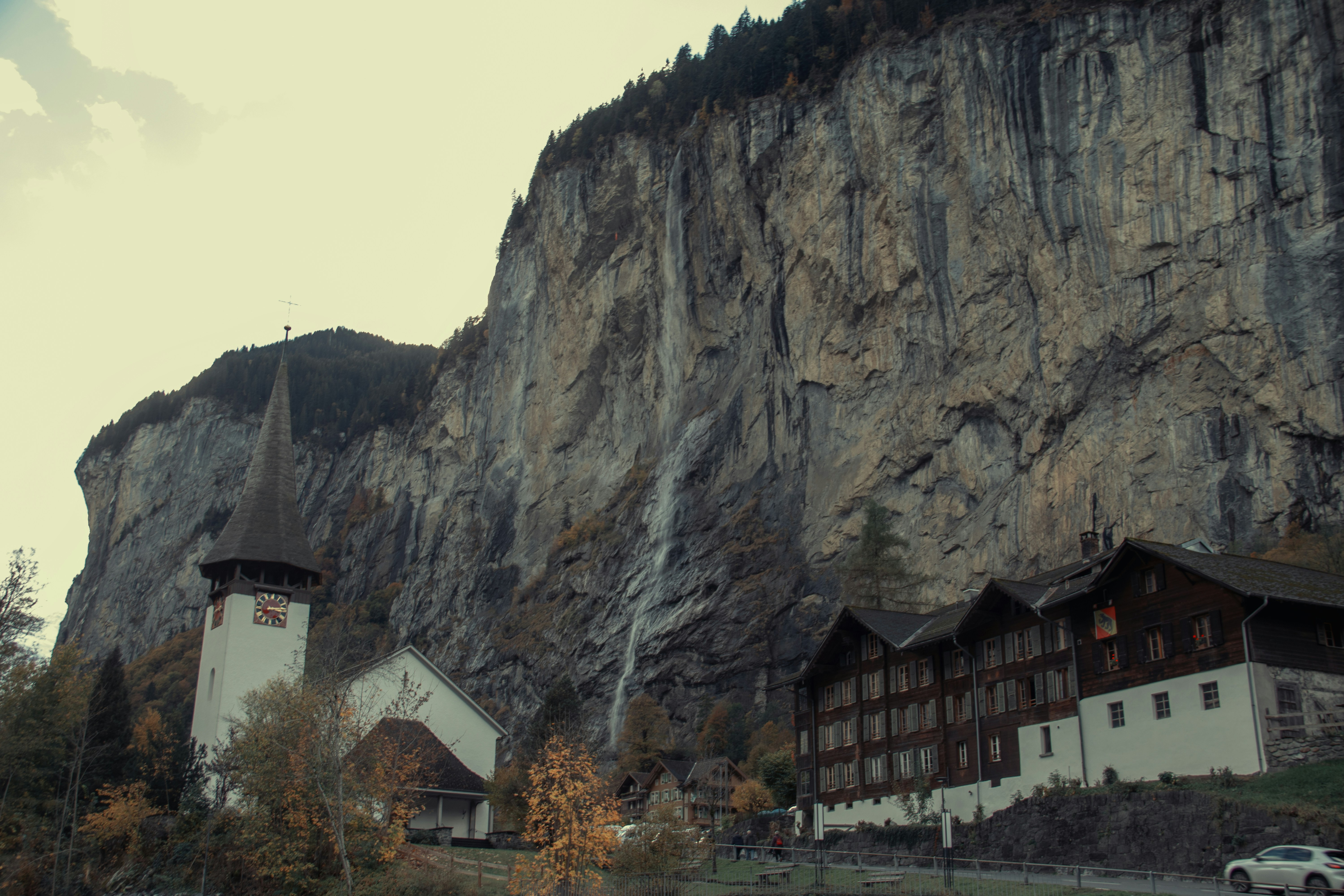 Village Among the Cliff: A Stone Church and Lodge Nestled Under Rugged Vistas