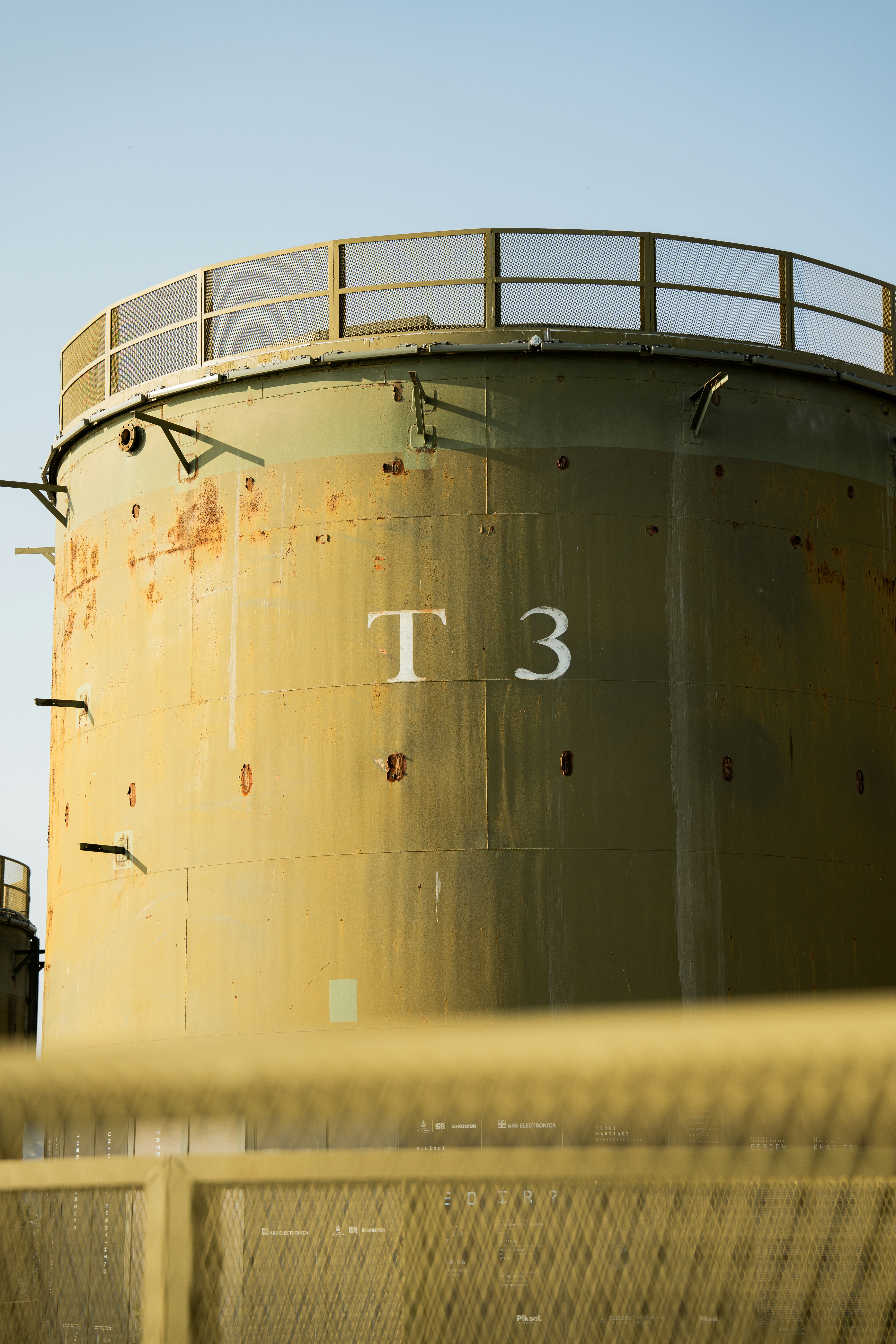 A large metal tower with a clock on it's side photo – Free Beykoz ...