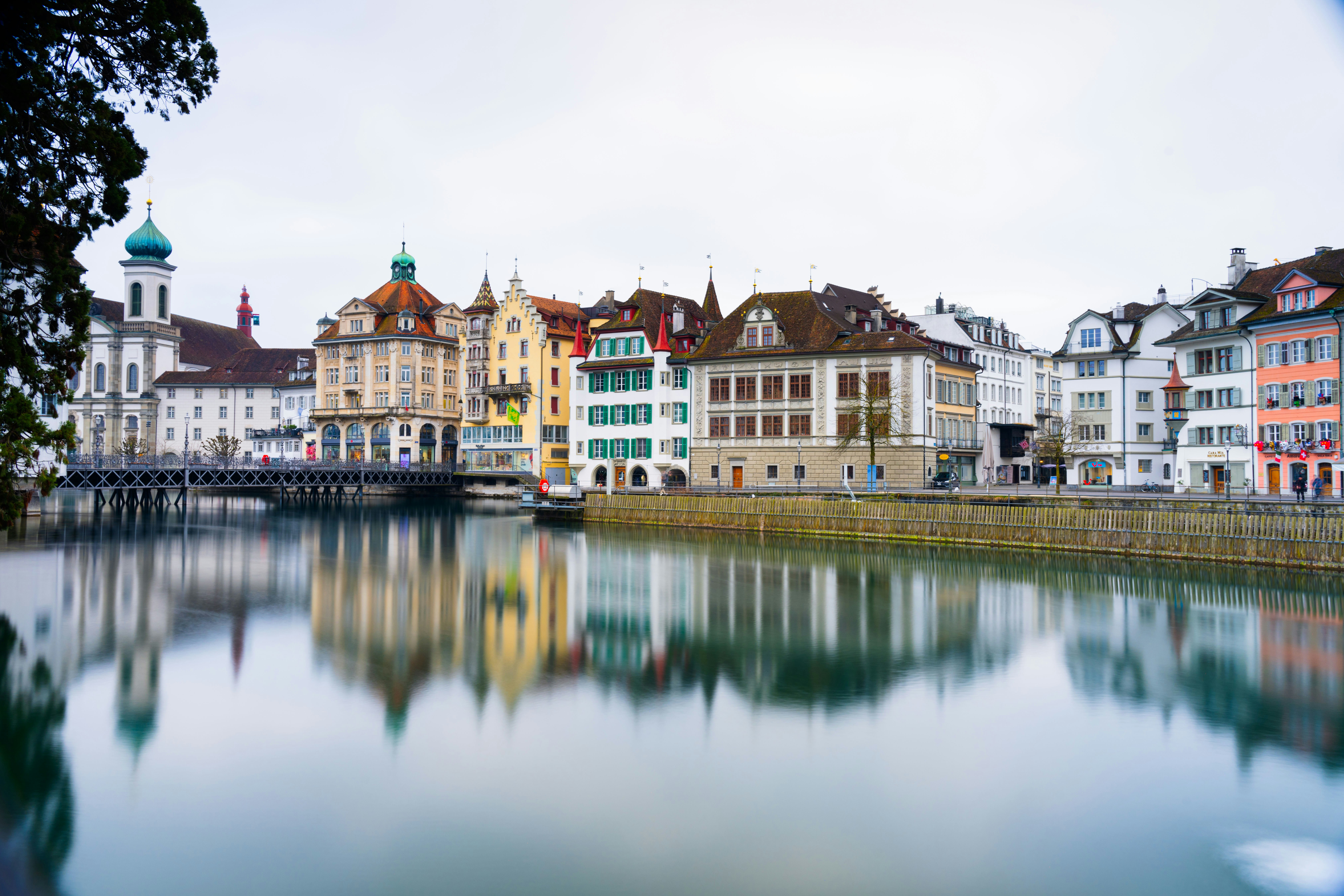 Pastel Row Along a Quiet European Riverfront