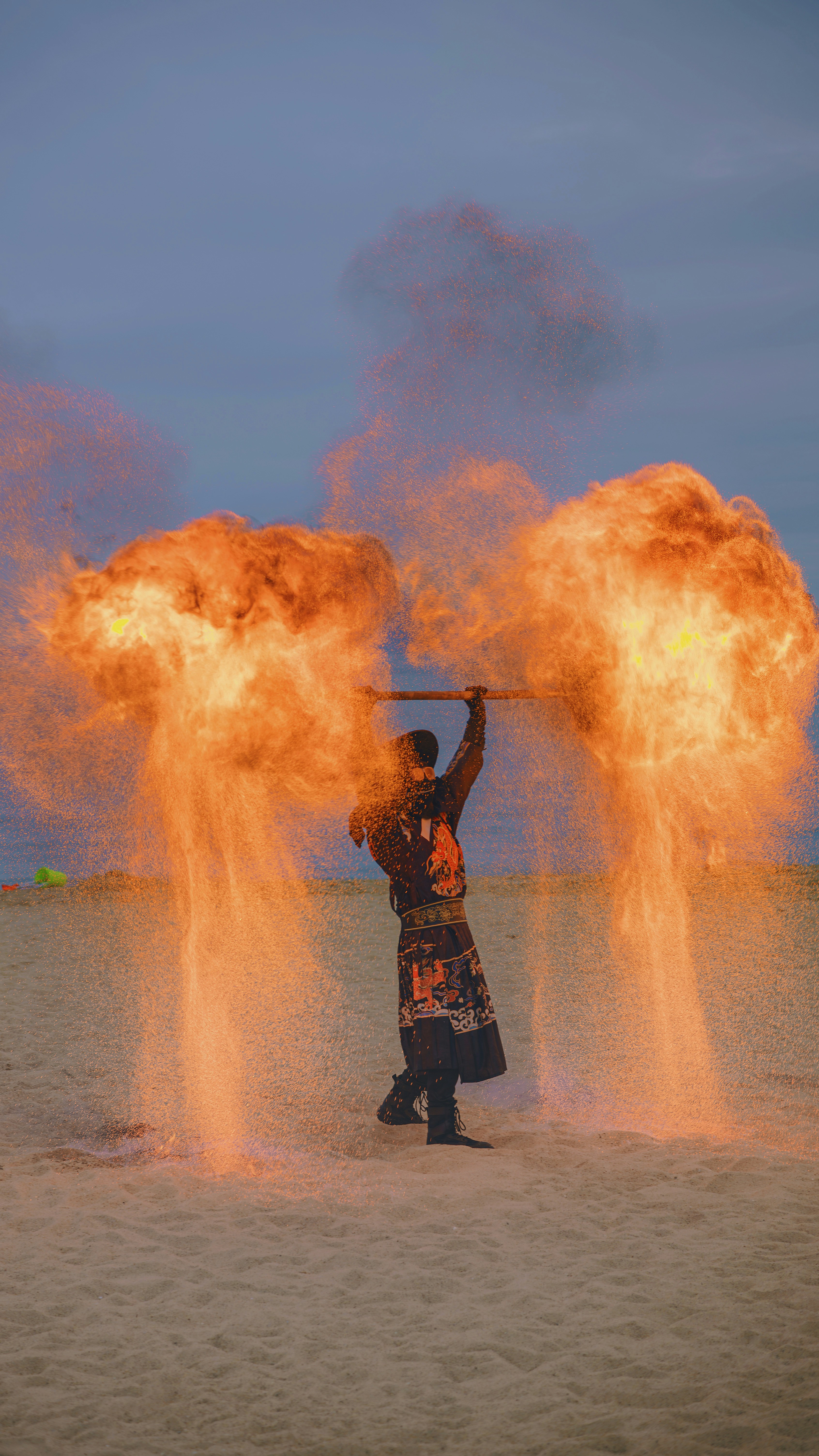 Rising Firebreath on the Beach: A Performer's Fiery Shield