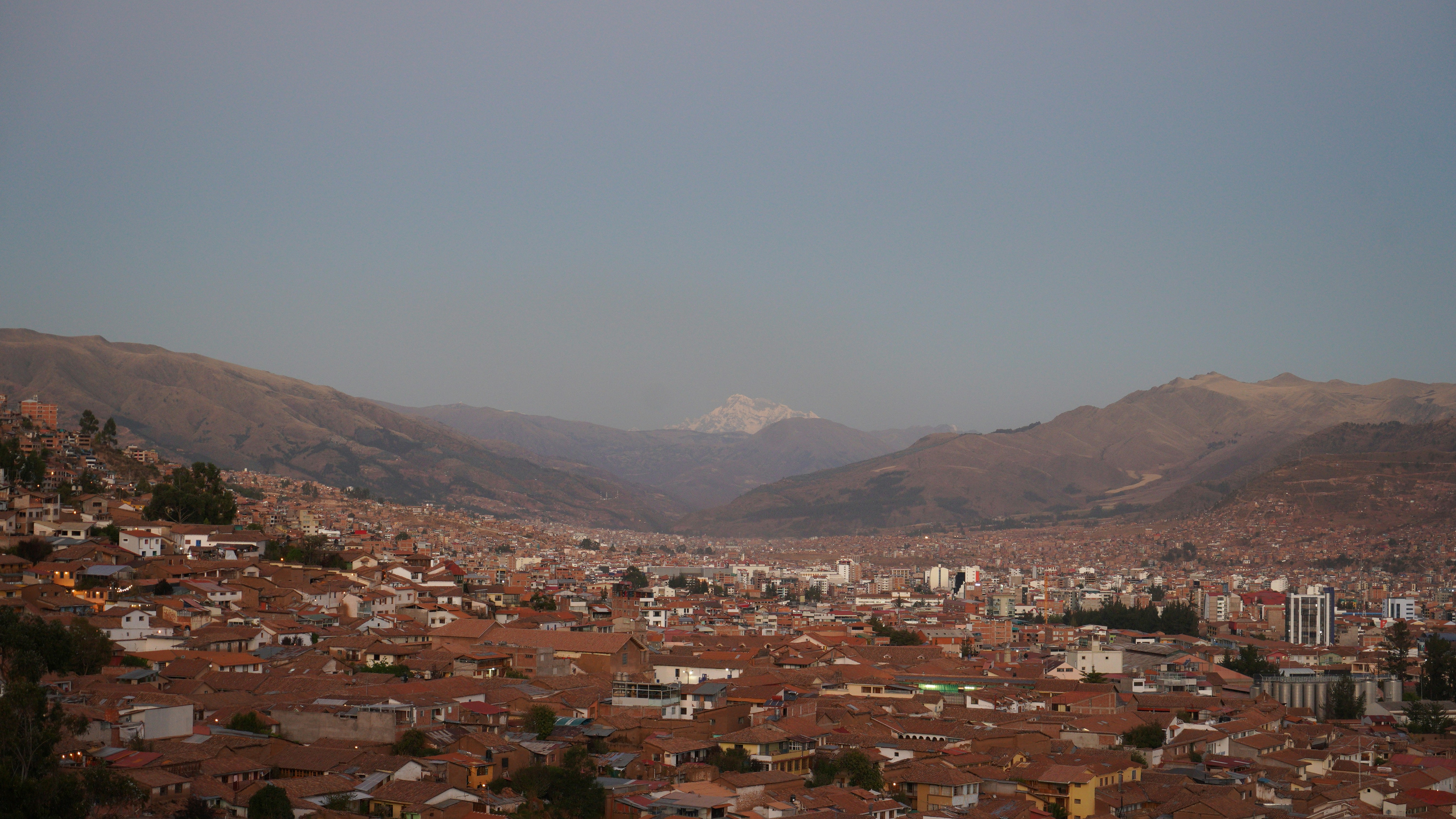andeans peru, city beautiful | A view of a city with mountains in the background