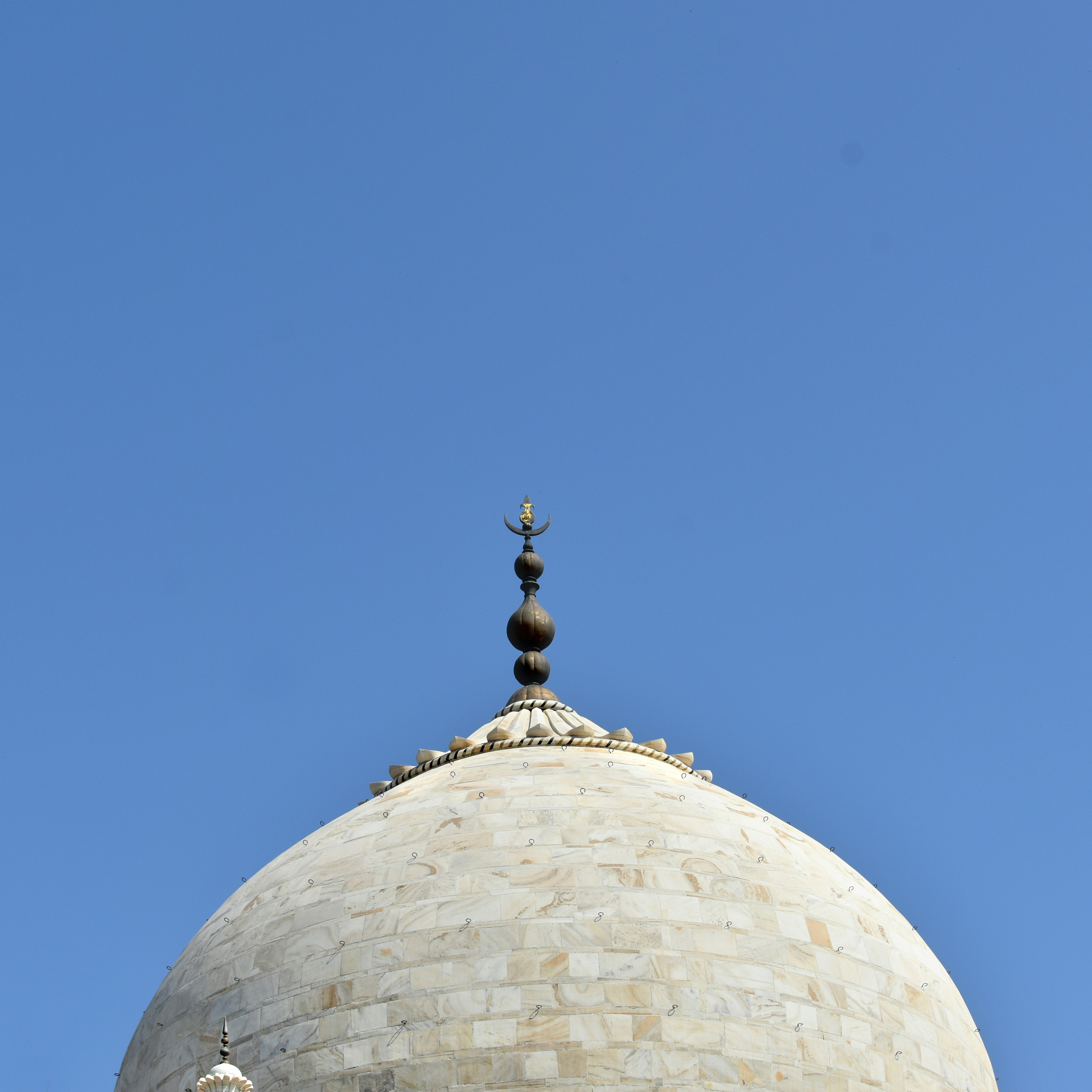 The Quiet Crown: Marble Dome Reaching Toward a Clear Sky