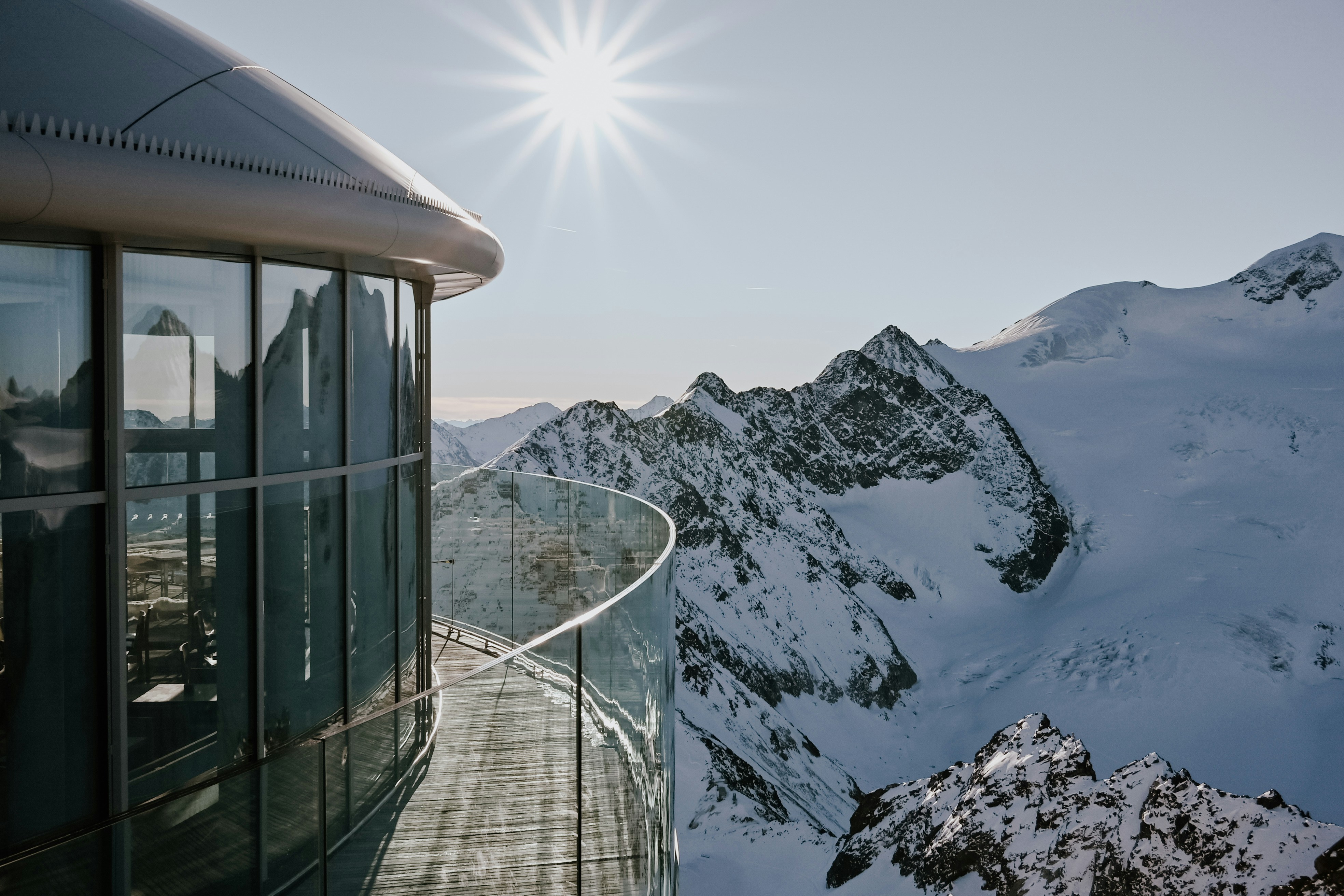 Glass Edge Harmony: Mountains Beyond