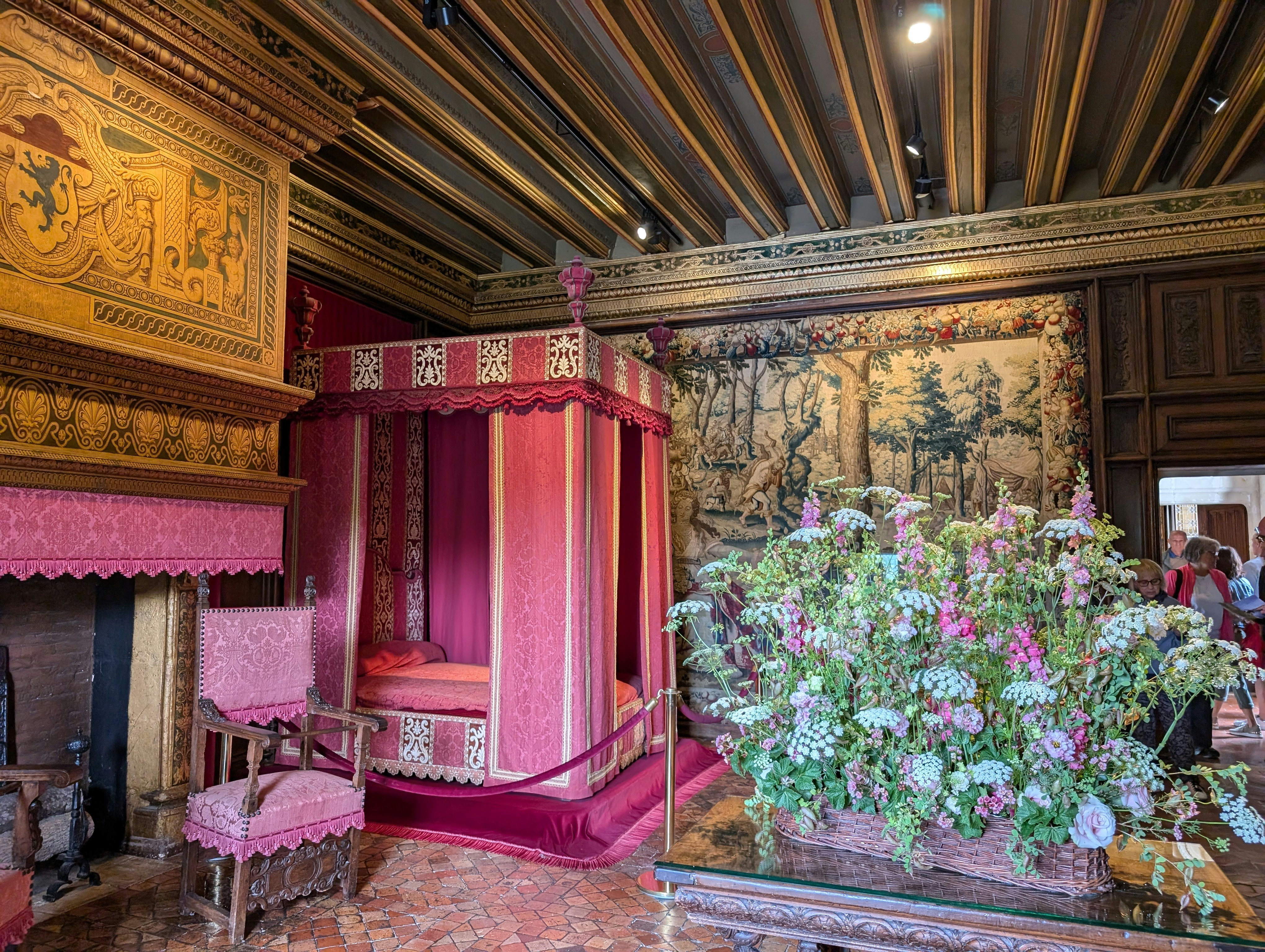 A room filled with furniture and paintings on the walls