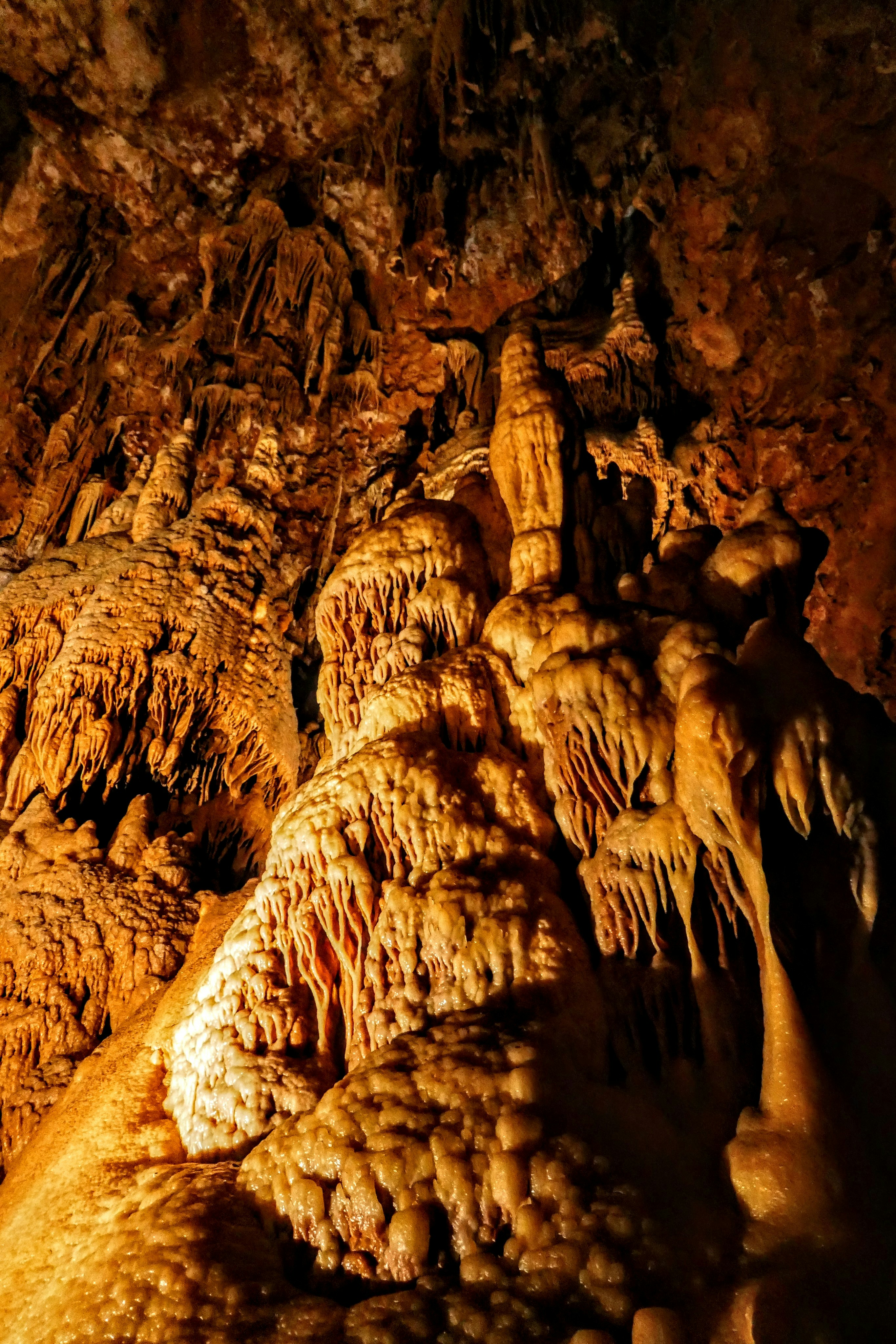 A cave filled with lots of different types of rocks photo – Free Gorges ...
