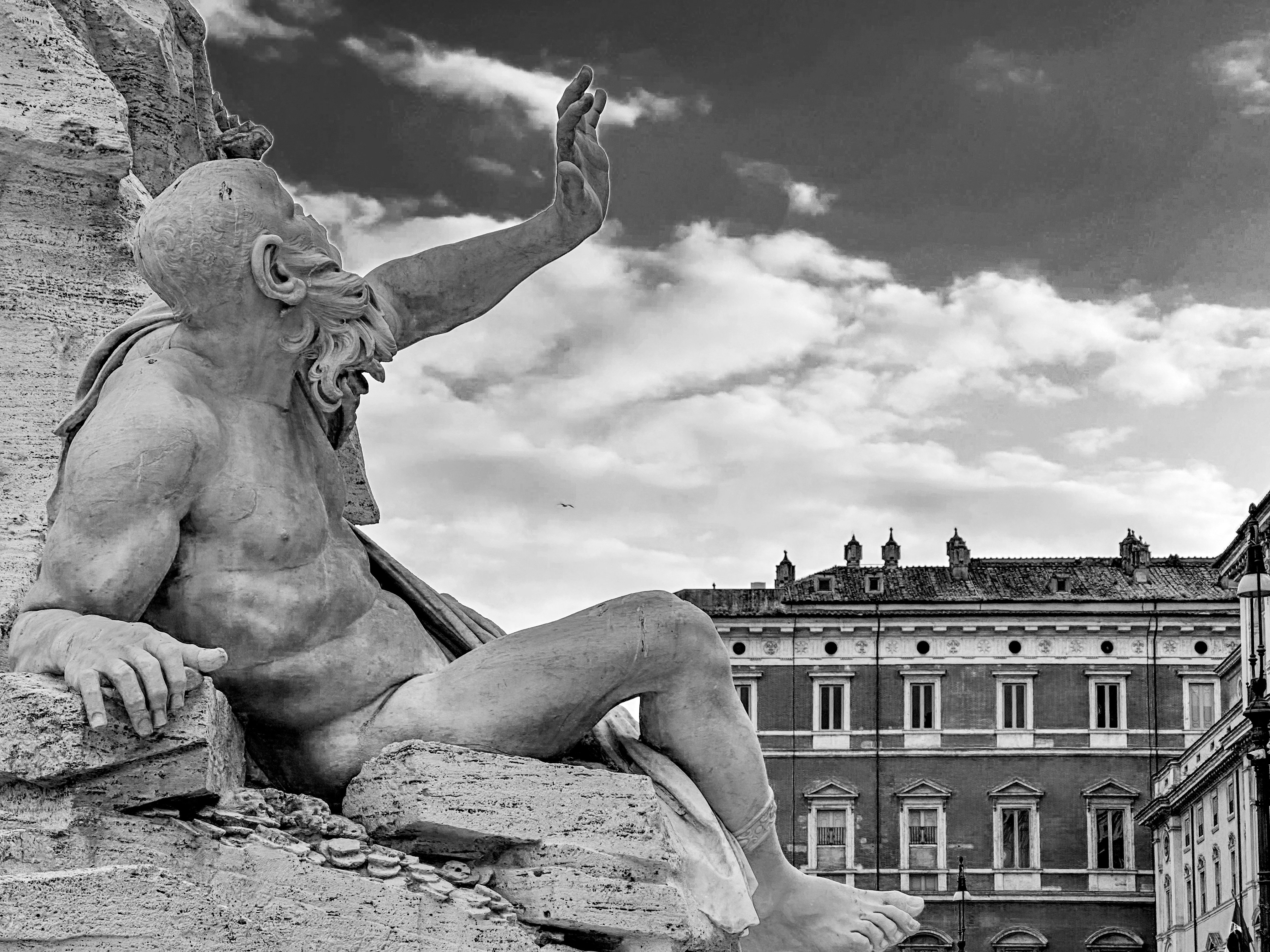 Ancient Gesture Against a Modern Skyline