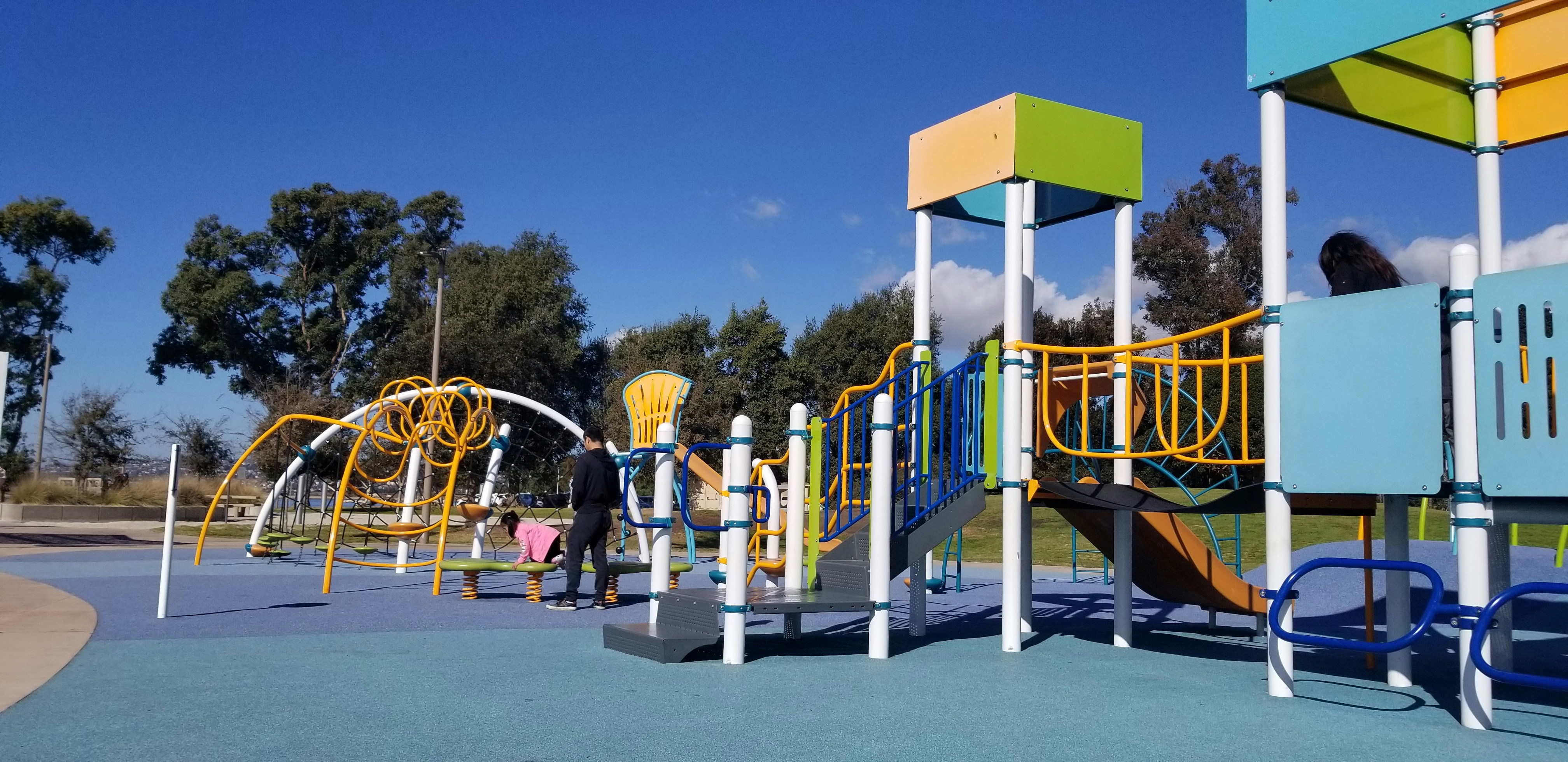 A children's play area in a park photo – Free Human Image on Unsplash