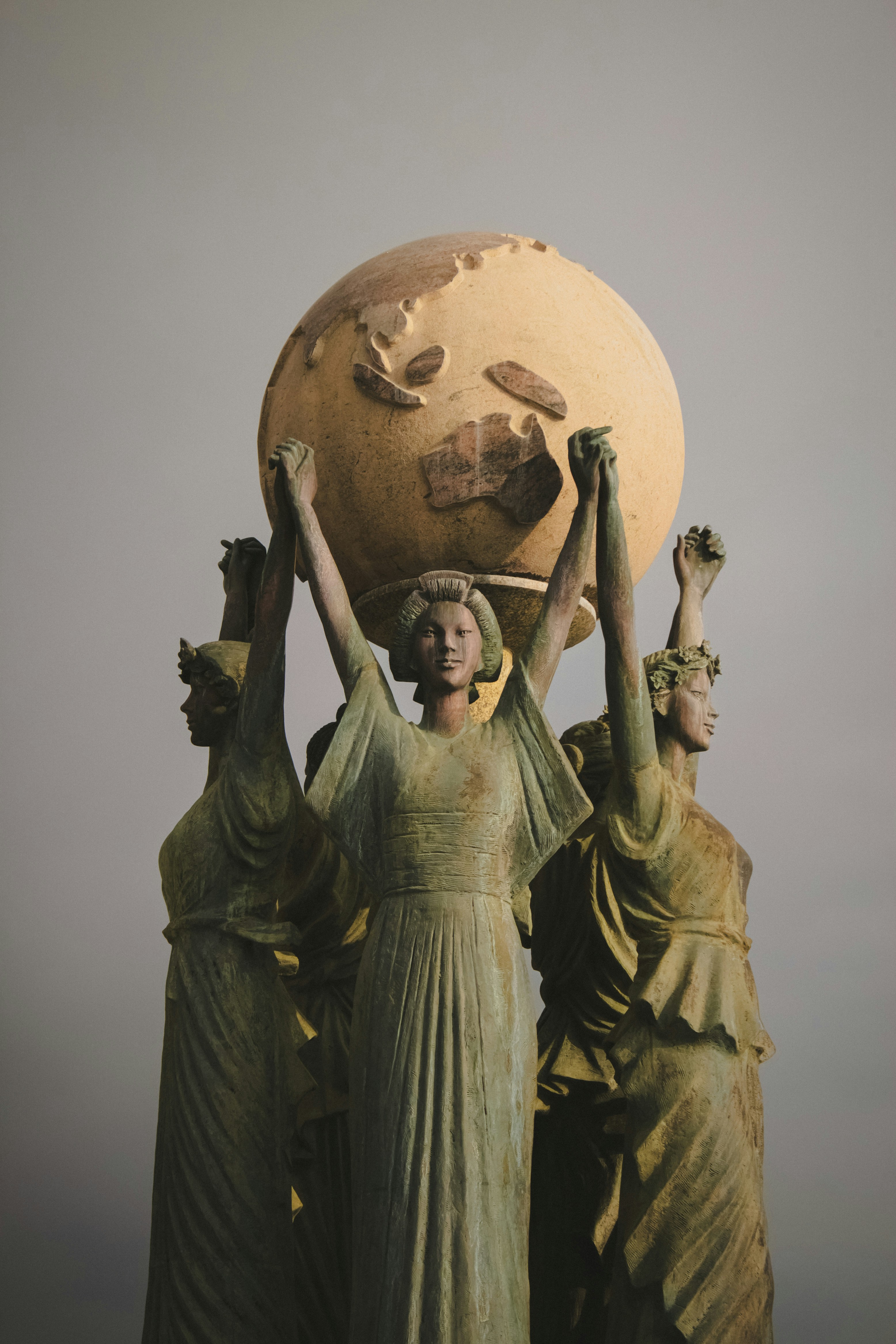 The Dawn-Borne Sphere: Trio of Bronze Figures