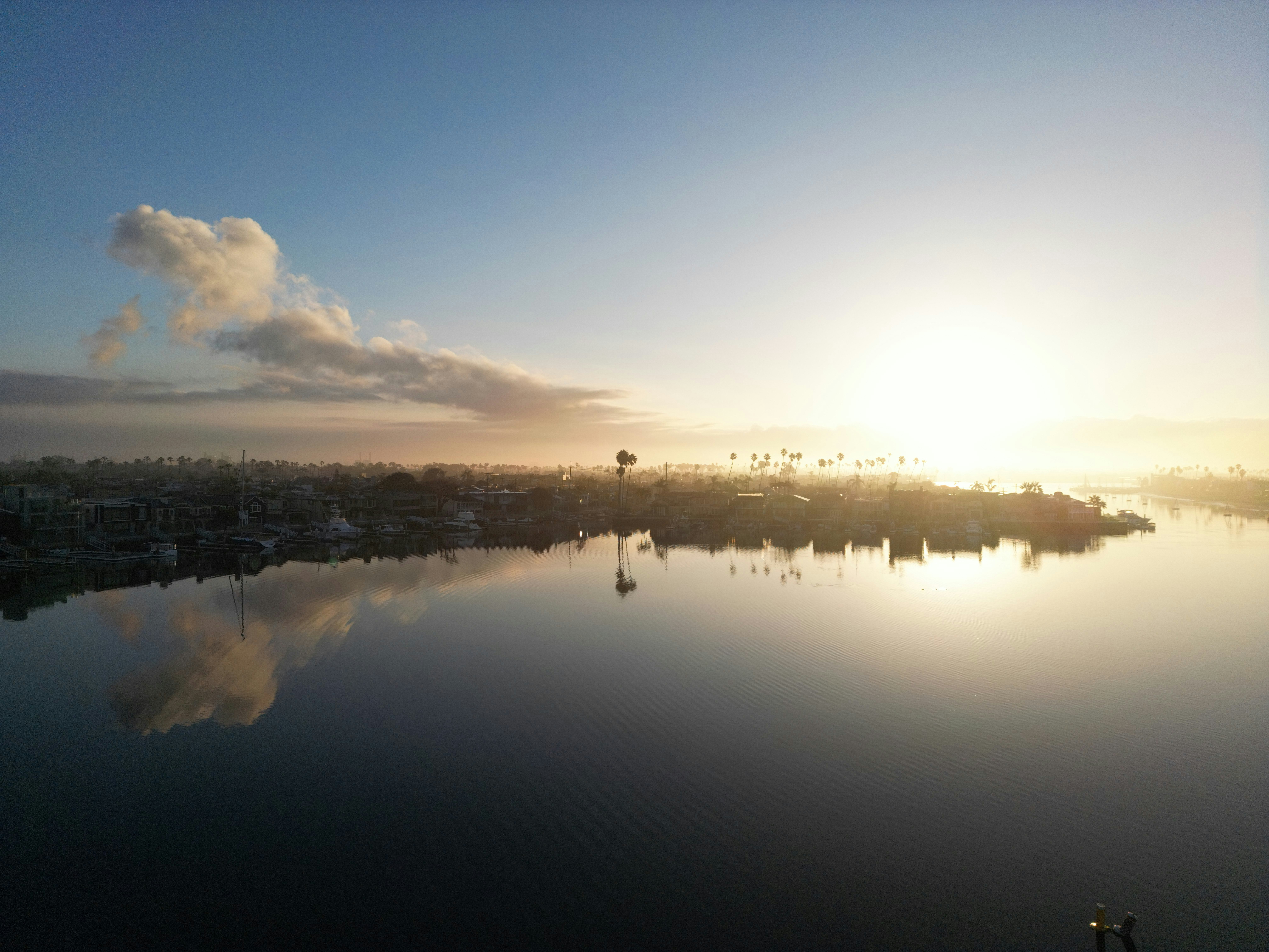 Golden Dawn Over Reflective Waterscape