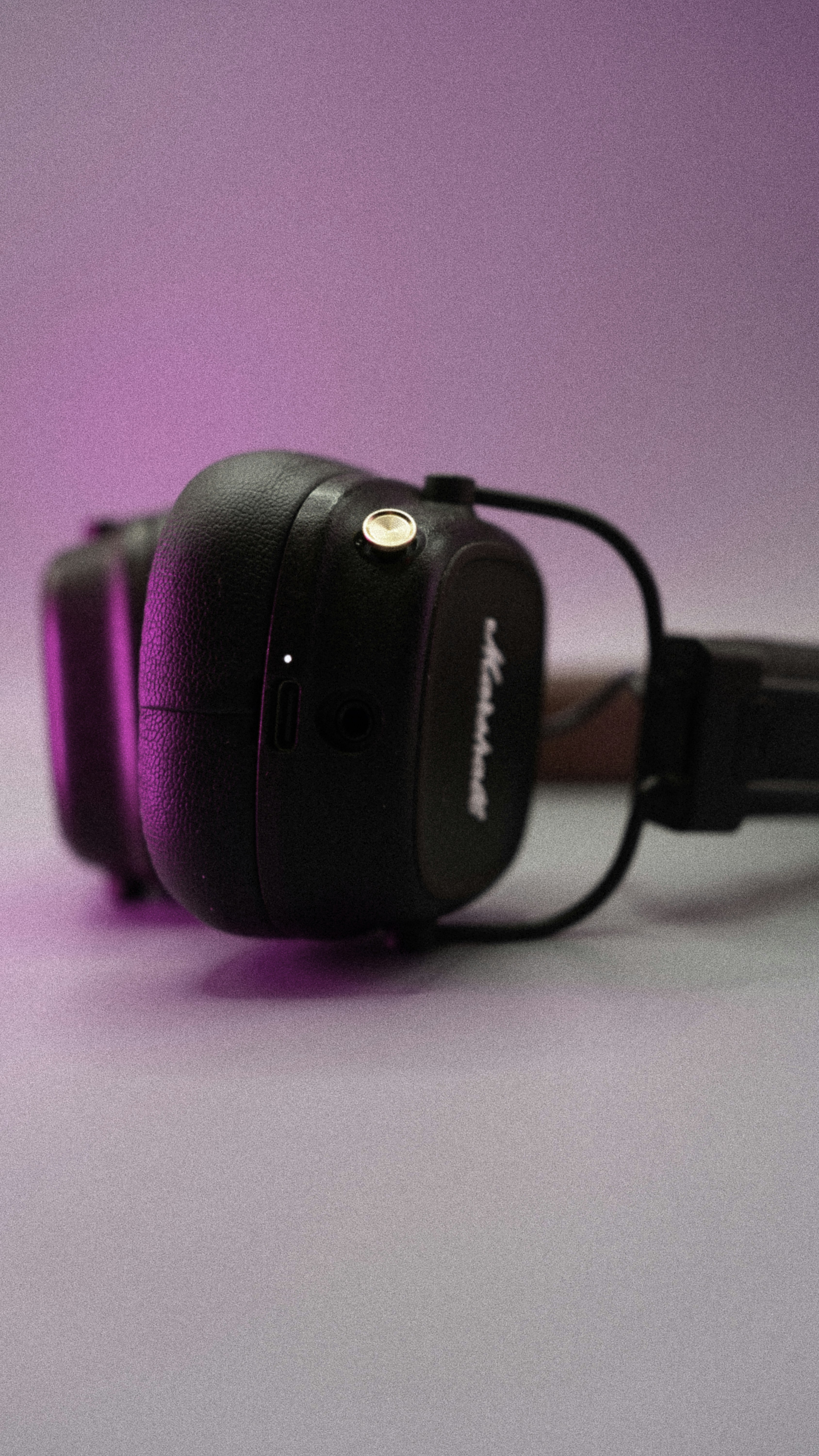 Purple Glow Envelops a Marshall Headphone — A Close-Up Study